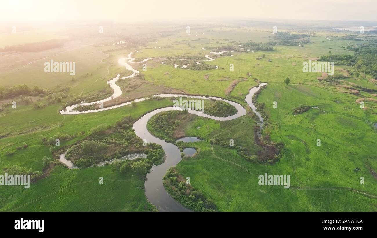 Aerial View: Flight over the Beautiful River and Green Fields Stock ...