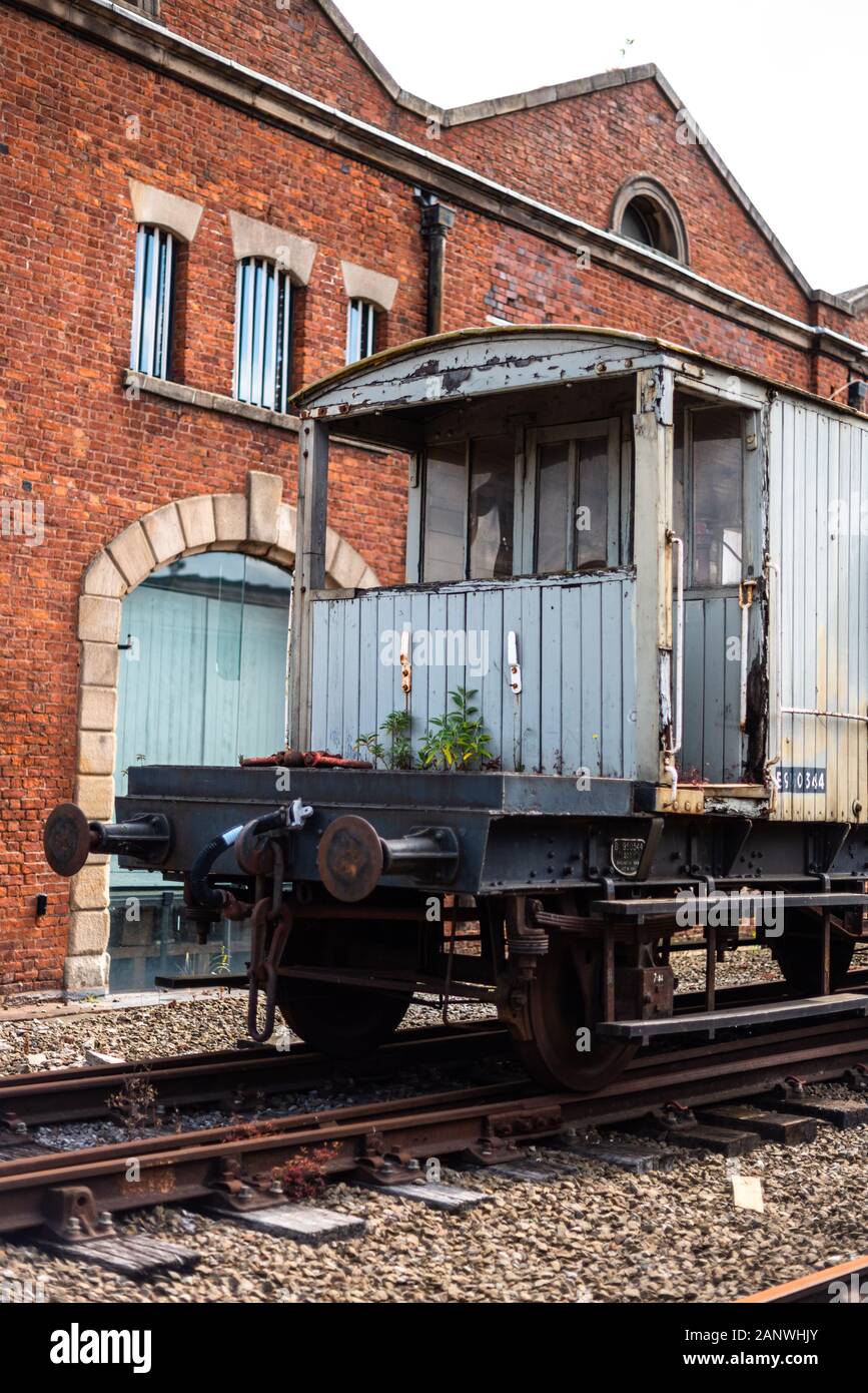 Close-up of outer wall of old abandoned train wagon science industry ...