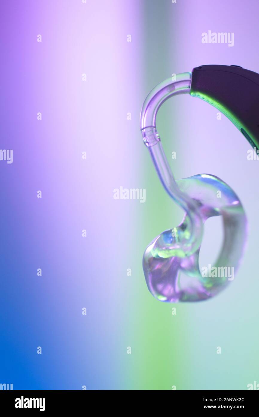 Modern digital hearing aid for deafness and deaf people Stock Photo - Alamy