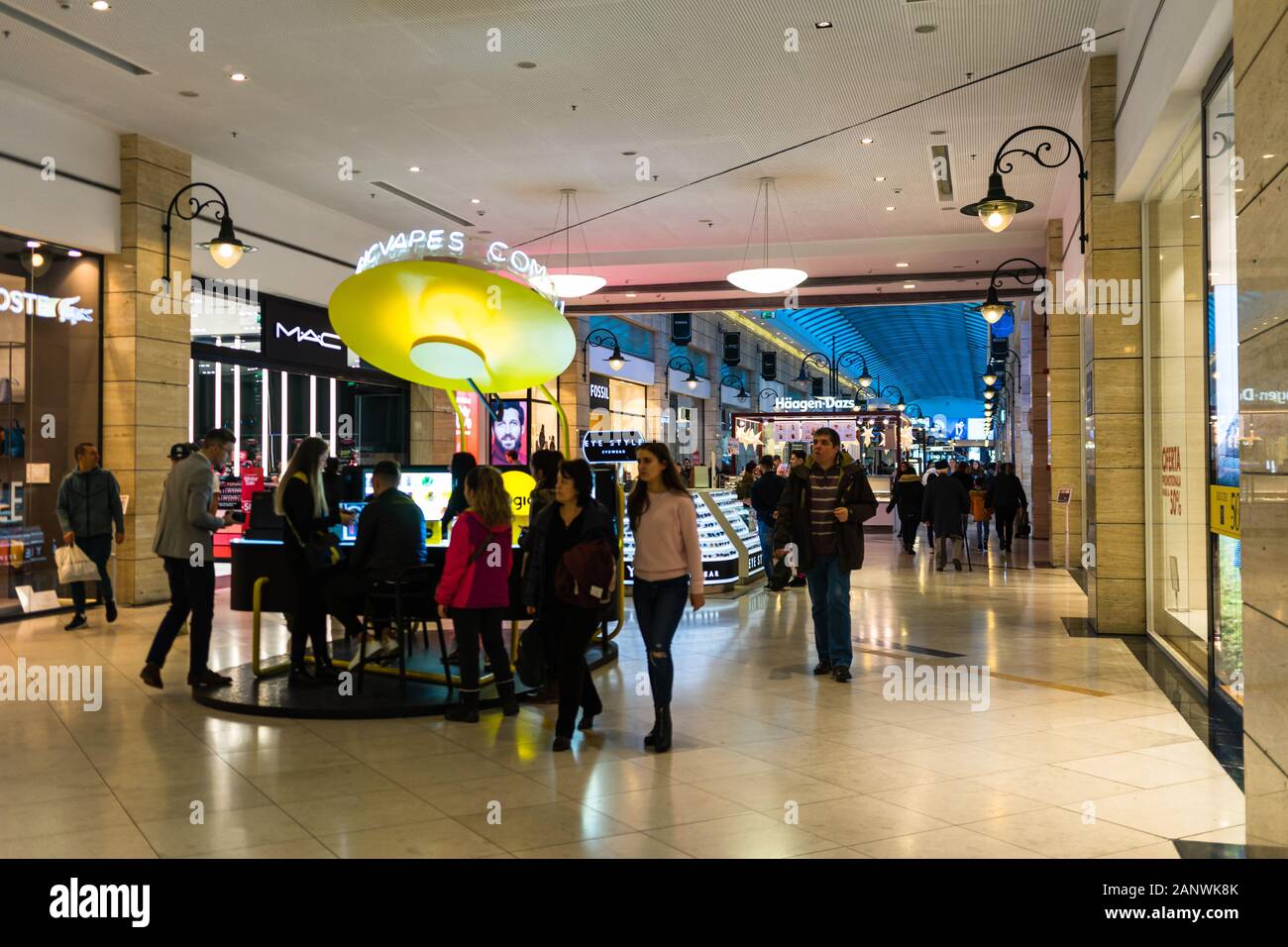 Shoppers visit the mall during winter at discount and sale season. AFI ...