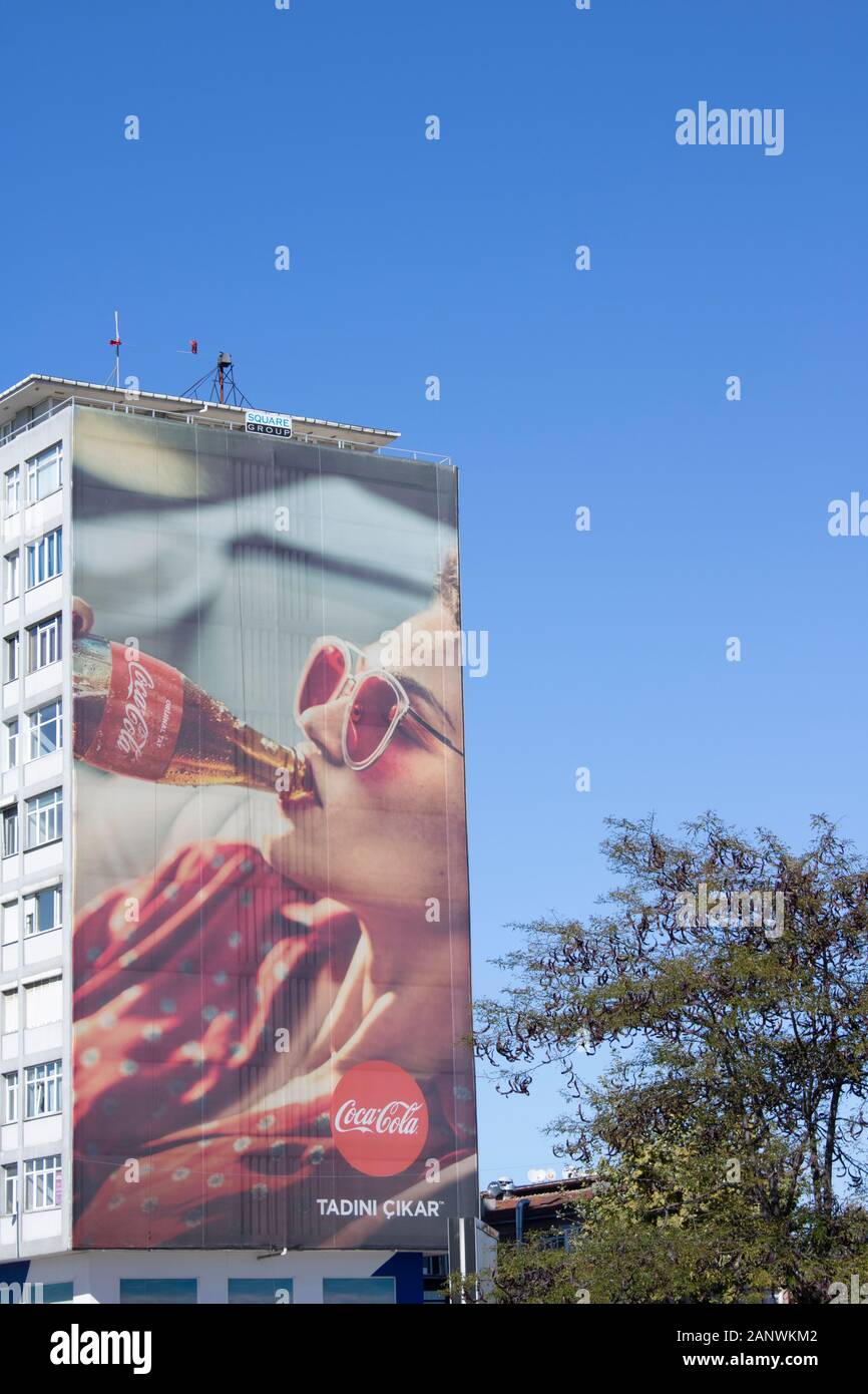 Large Coca Cola billboard on rooftop against sky, Coca-Cola advertising ...