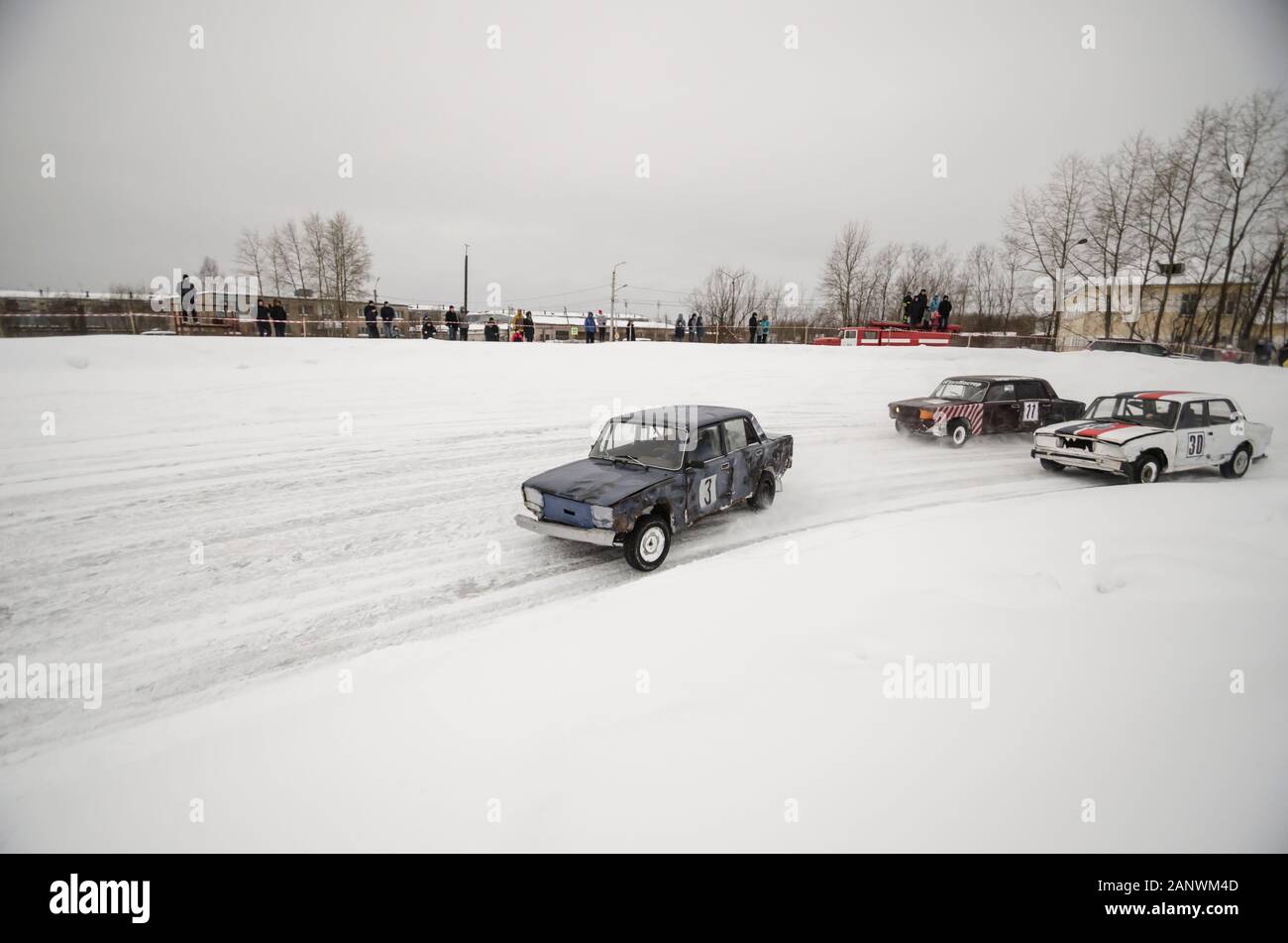 Winter racing on the ice track. Russian racing car company Lada Stock ...