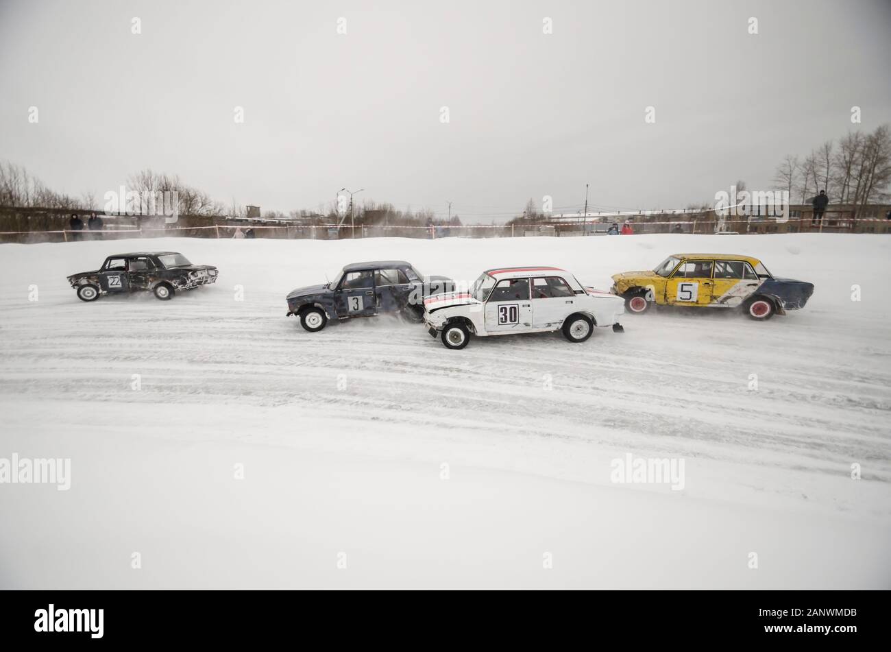 Winter racing on the ice track. Russian racing car company Lada Stock ...