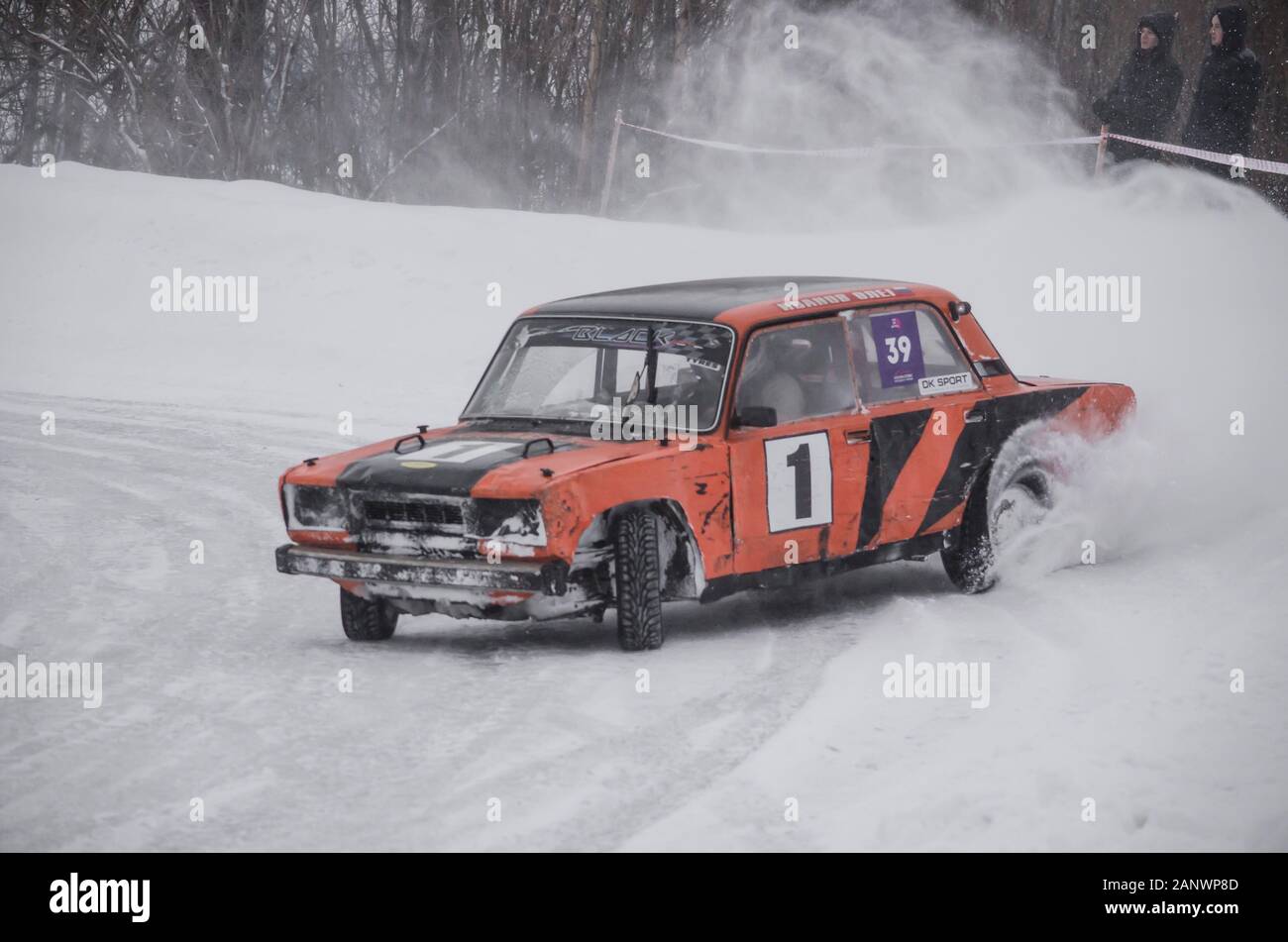 Winter racing on the ice track. Russian racing car company Lada Stock ...