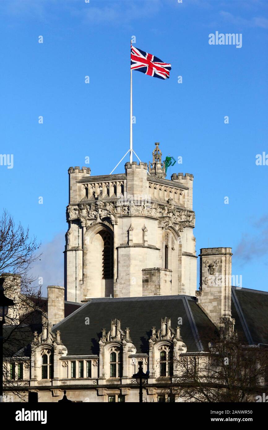 Union Jack flag flying above tower of the Middlesex Guildhall building ...