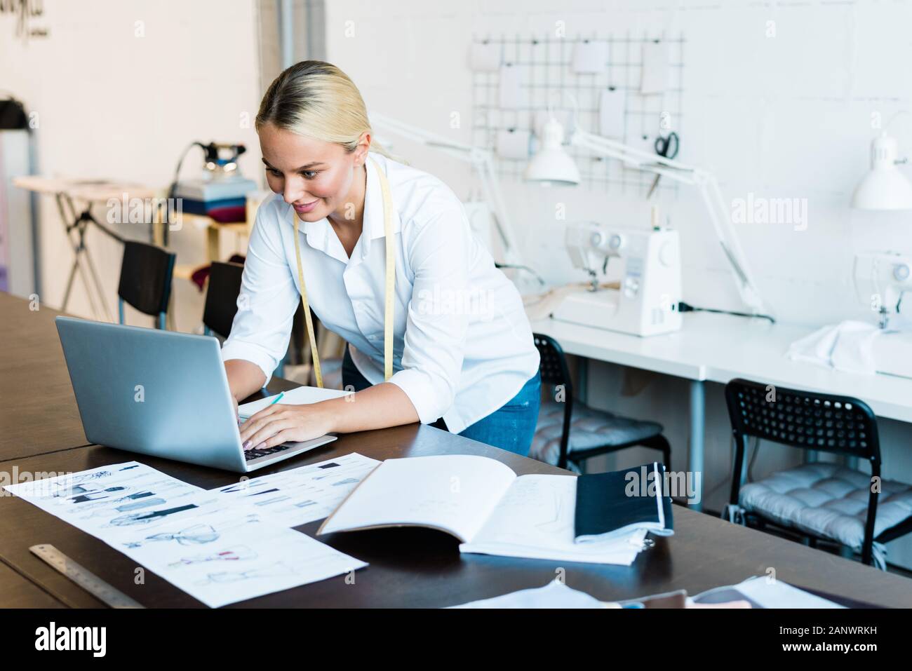 Making online sewing patterns Stock Photo - Alamy