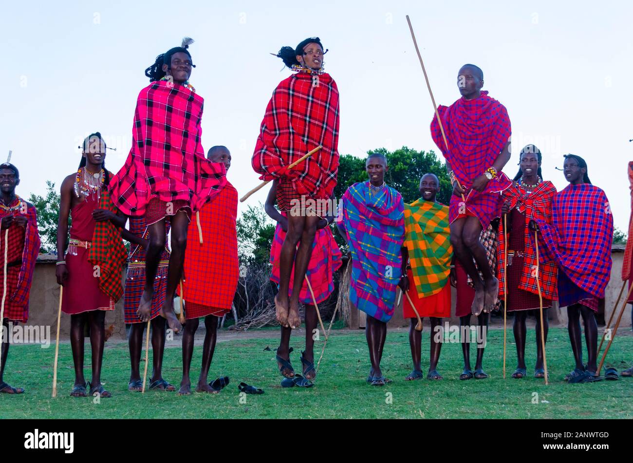 A group masai tribesman dancing in the village inside Masai Mara ...