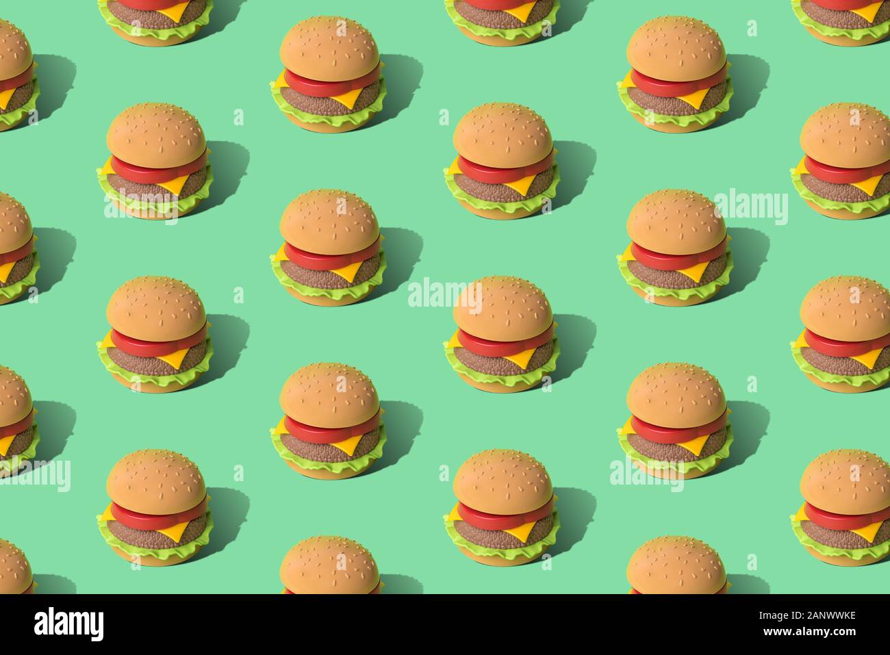 Fast food hamburger pattern on pastel green background minimal creative ...