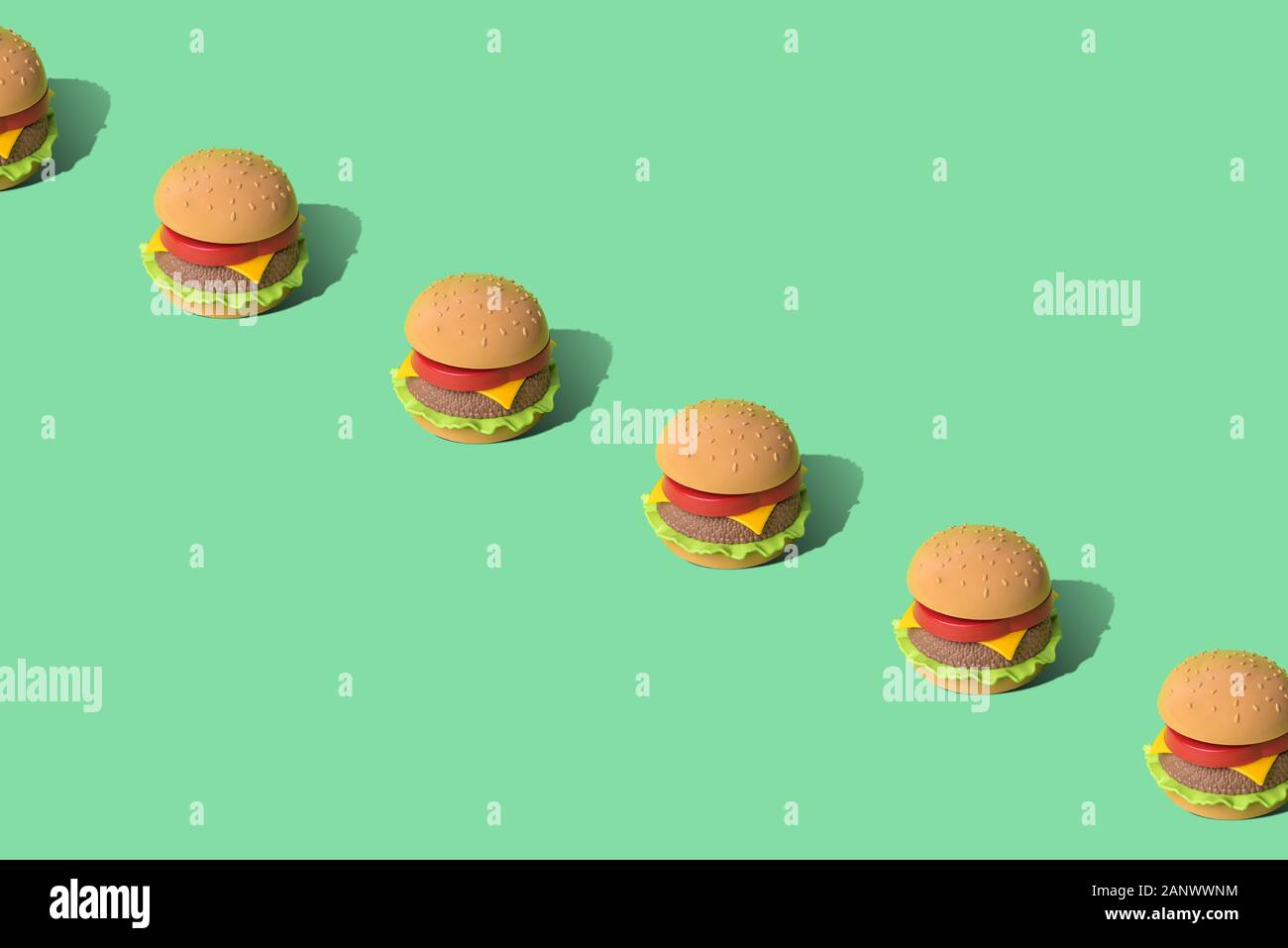 Fast food hamburgers on pastel green background minimal creative junk ...