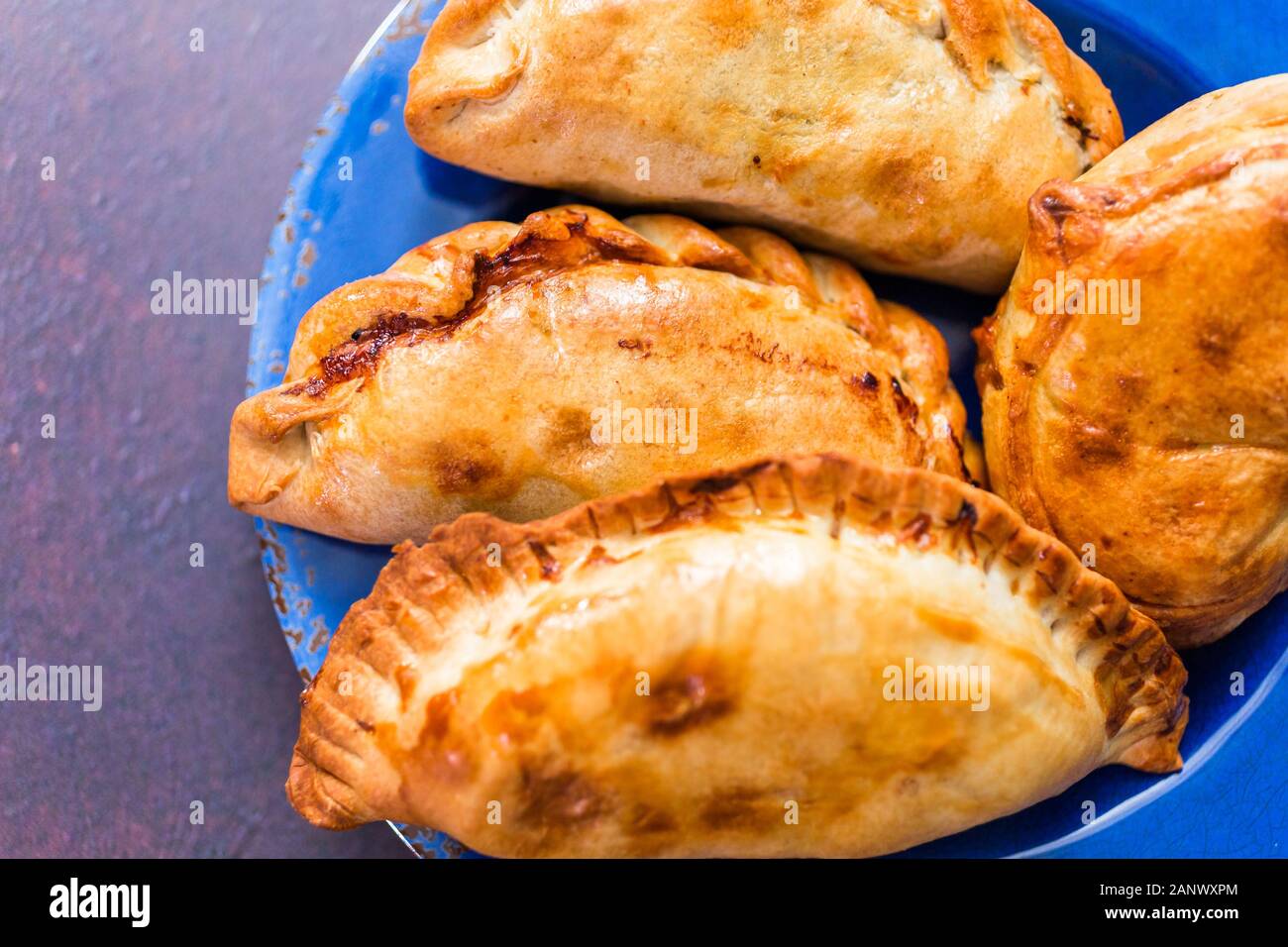 Homemade large empanadas with different staffings Stock Photo - Alamy