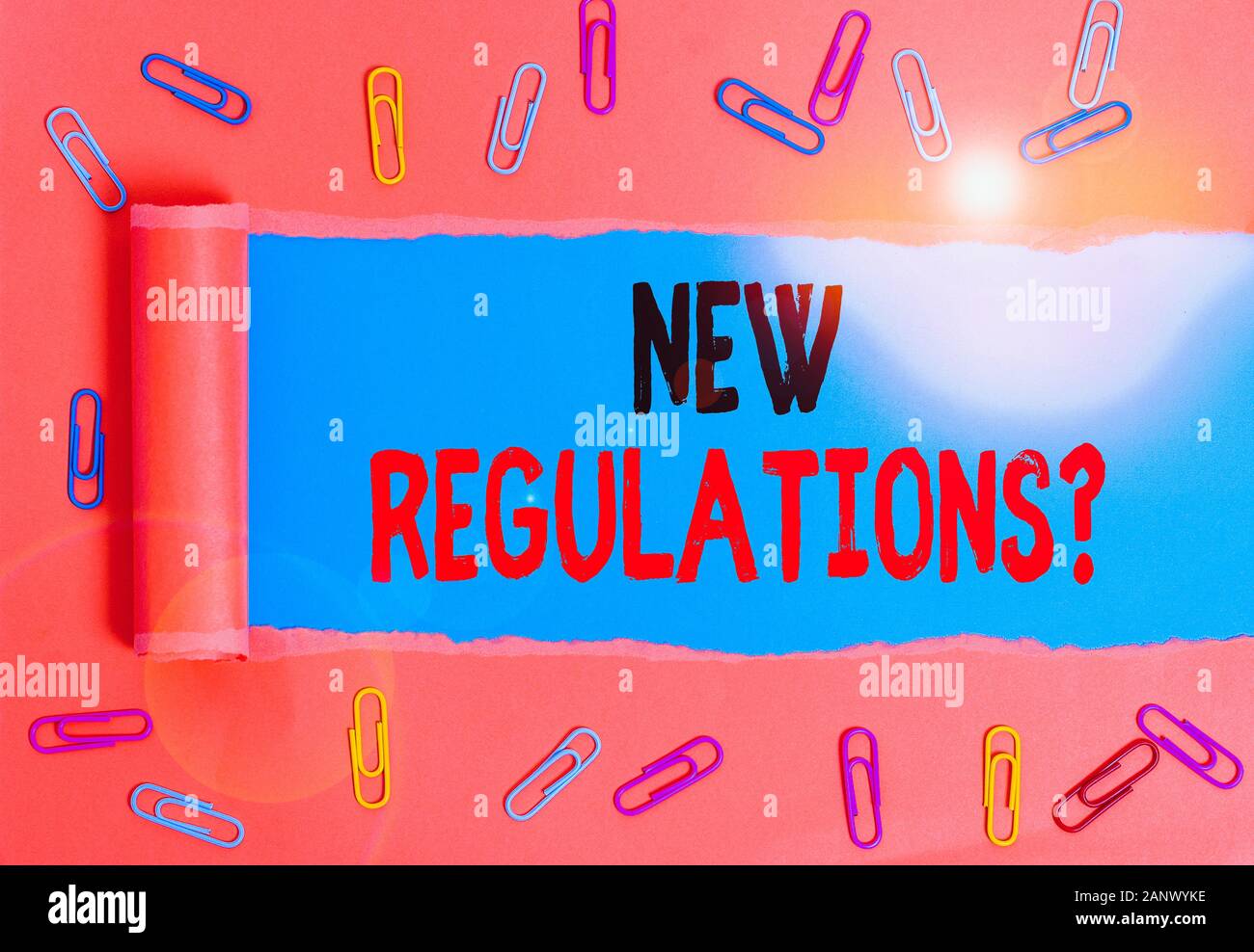 Writing note showing New Regulations Question. Business concept for ...