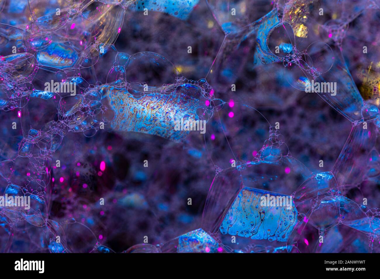 Creative abstract background made of chain of bubbles structure in dark ...