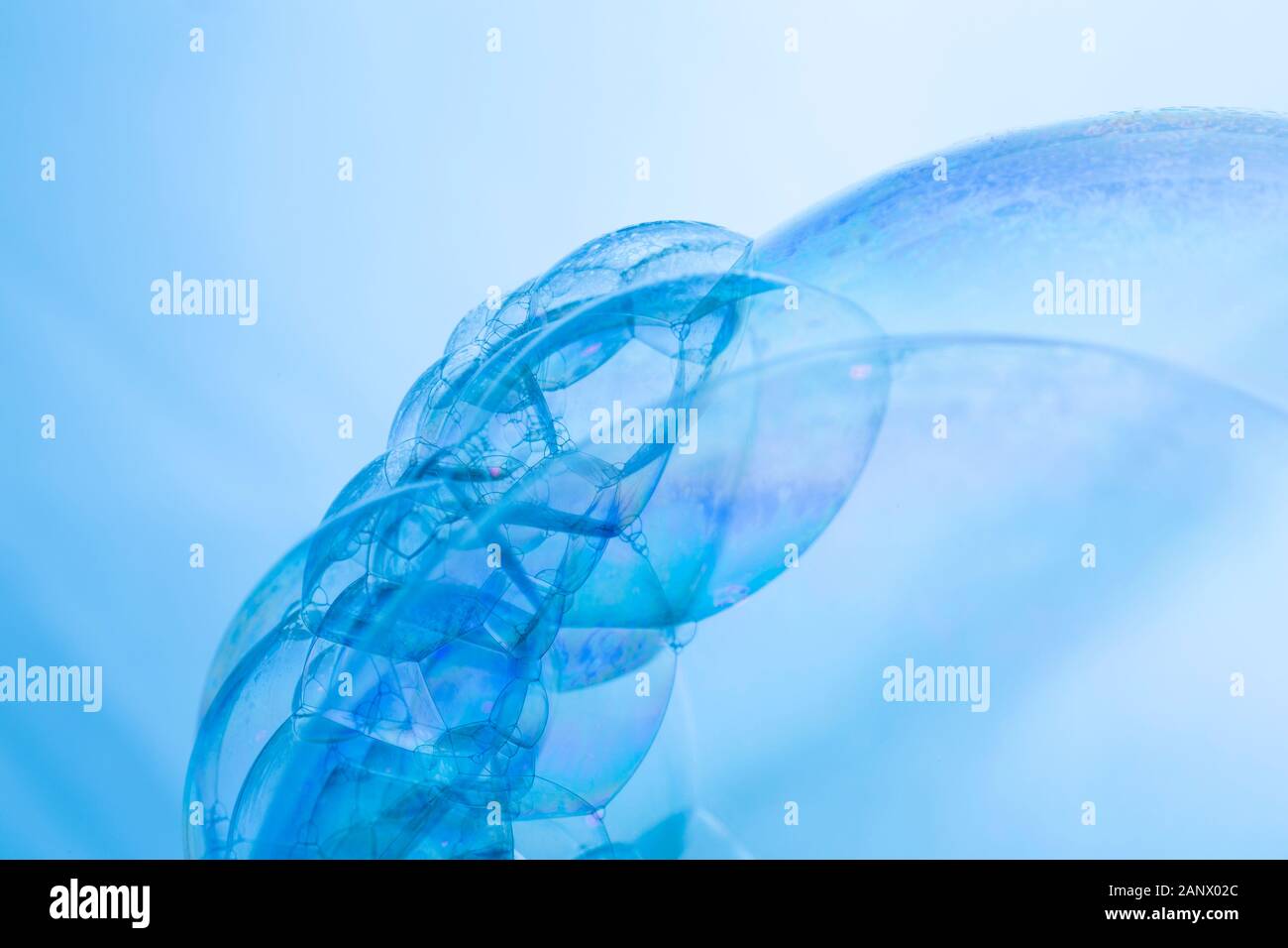 Creative abstract background made of chain of bubbles structure in blue ...