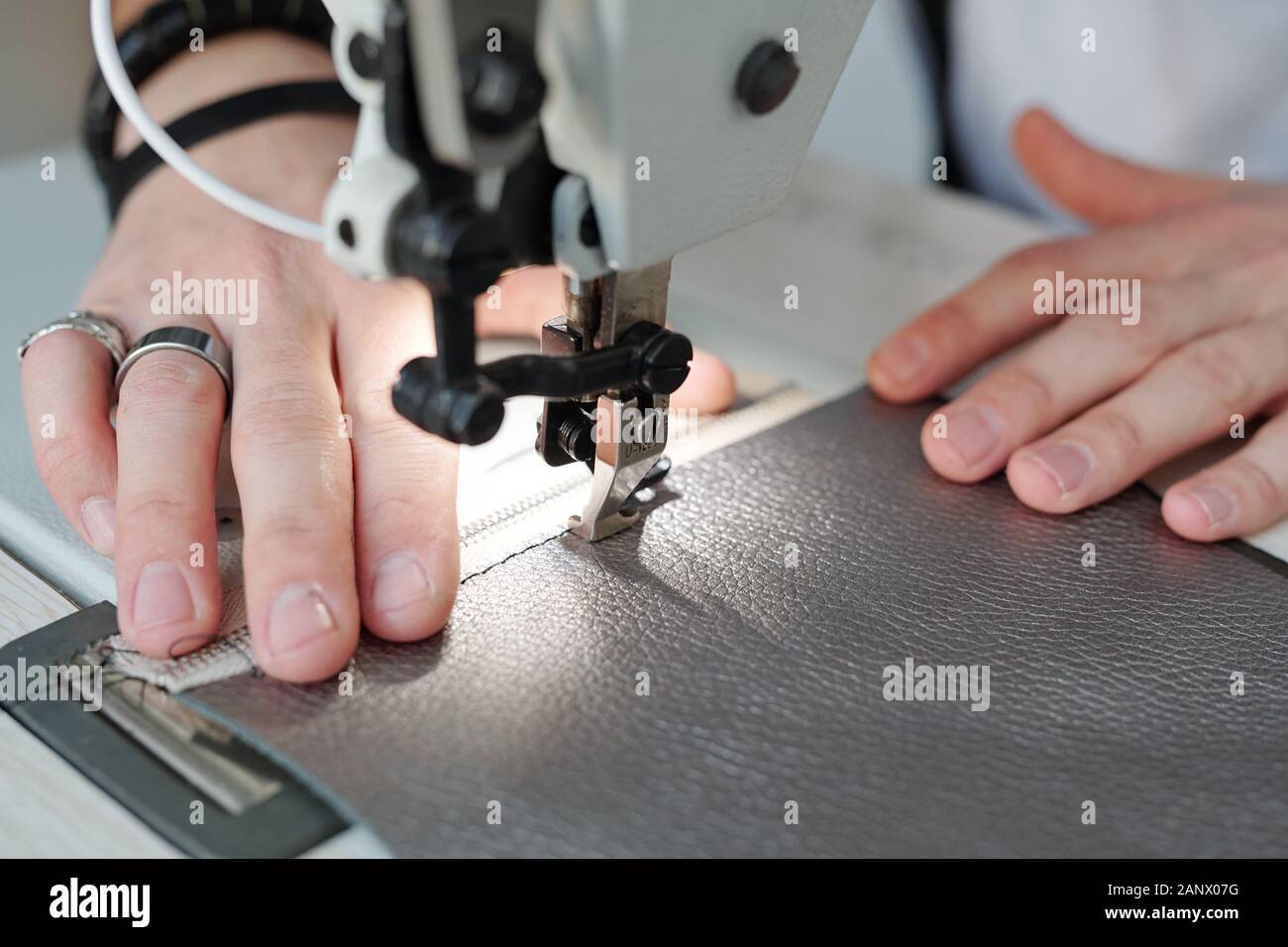 Using sewing machine Stock Photo - Alamy