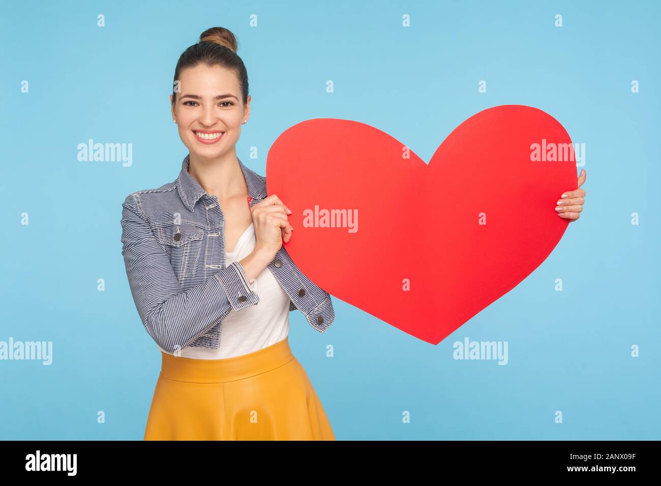 Beautiful happy fashionably dressed woman with amiable smile holding ... Beautiful happy fashionably dressed woman with amiable smile holding ...