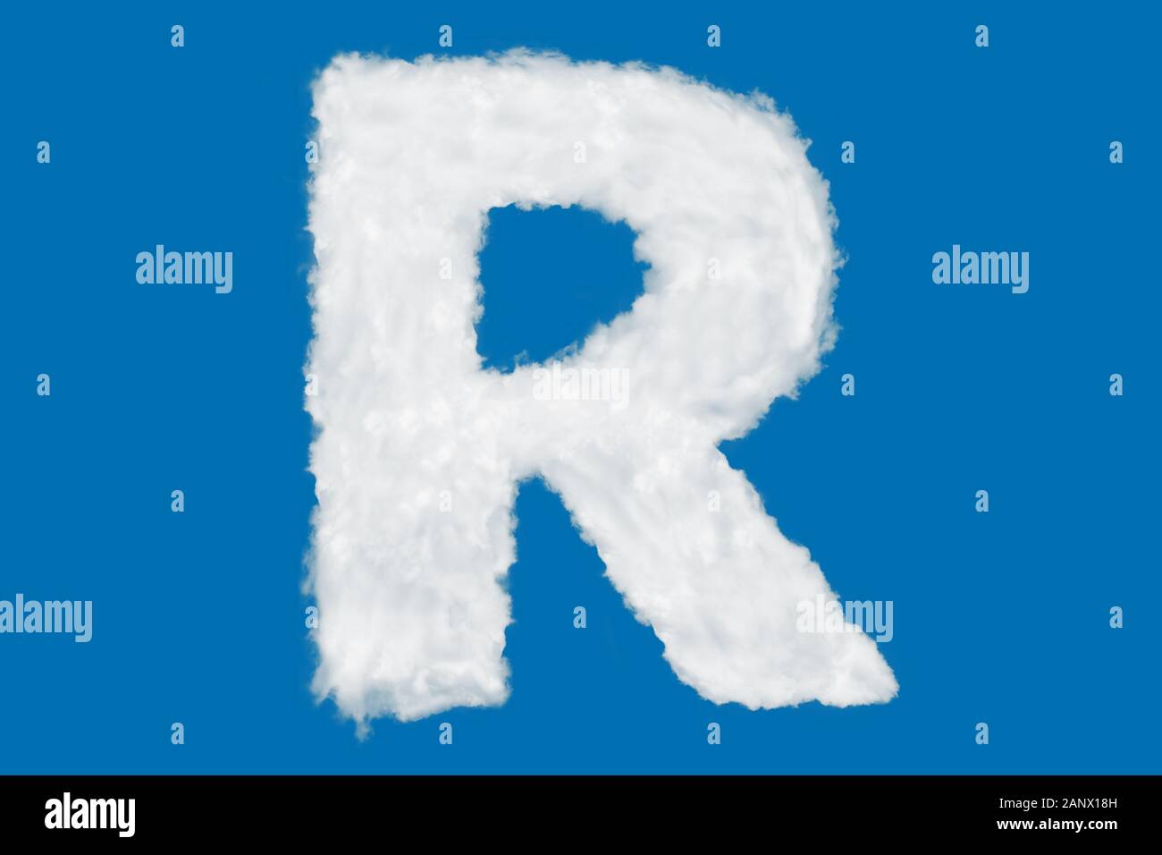 Letter R font shape element made of clouds on blue background over sky ...