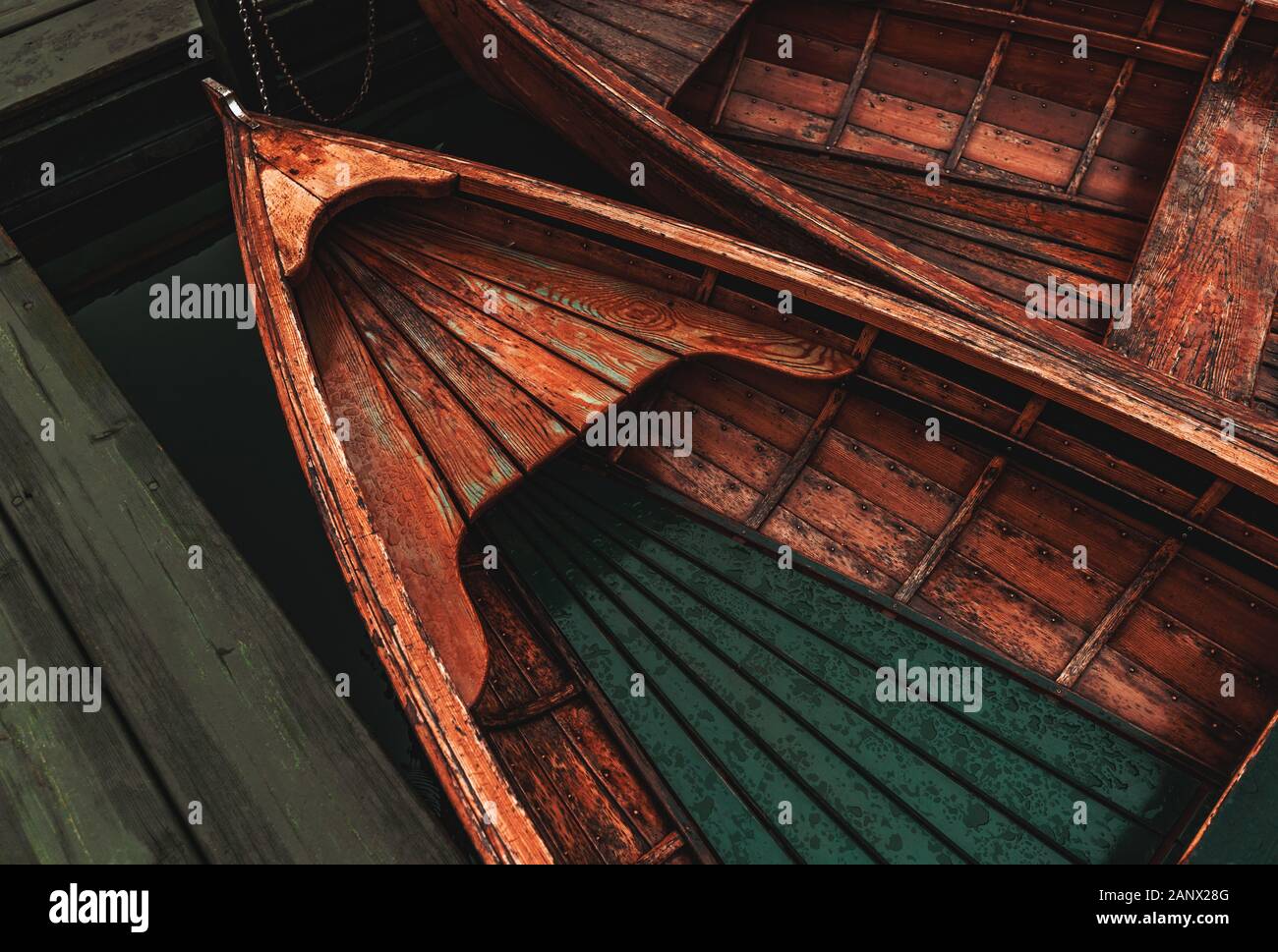 Wooden dinghy rowboat on lake Bohinj in morning in Ribcev laz, Slovenia ...