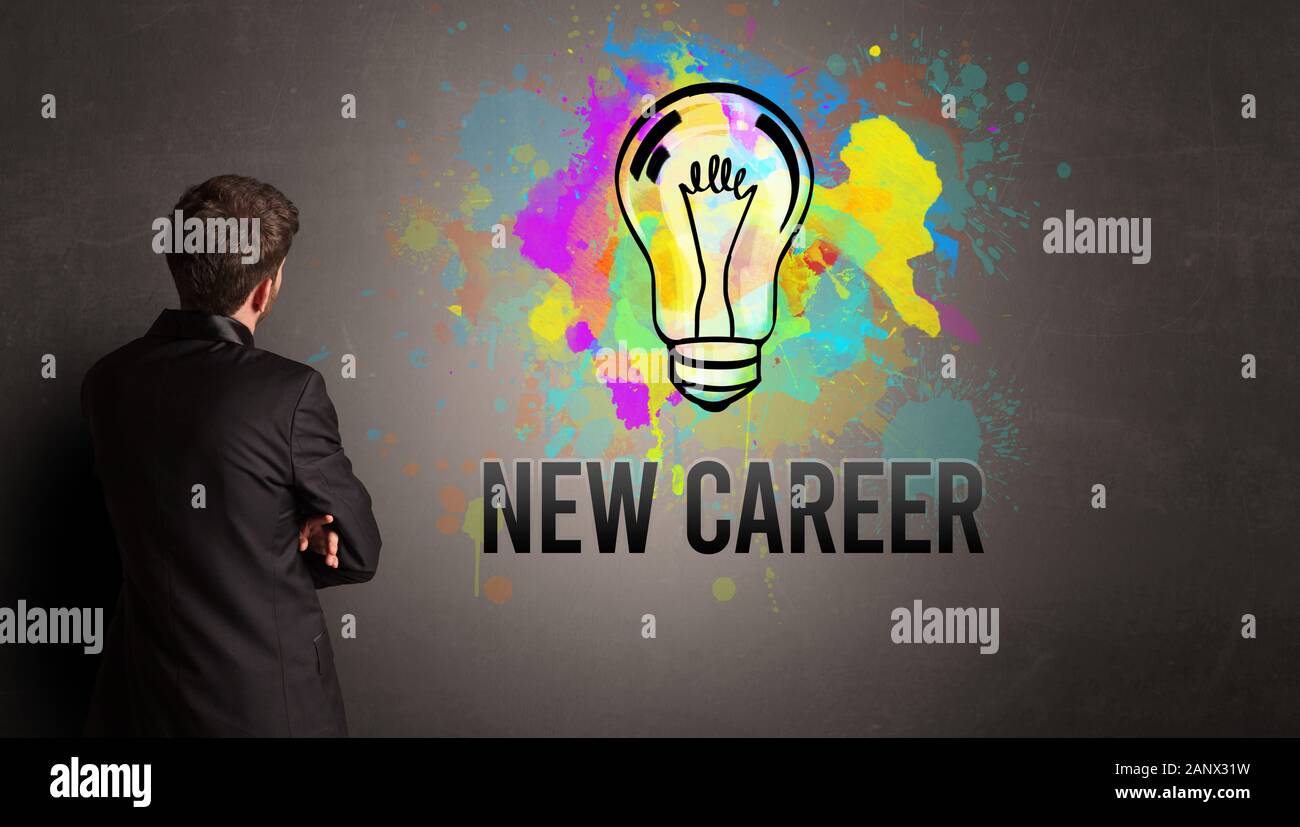 businessman drawing colorful light bulb with NEW CAREER inscription on ...