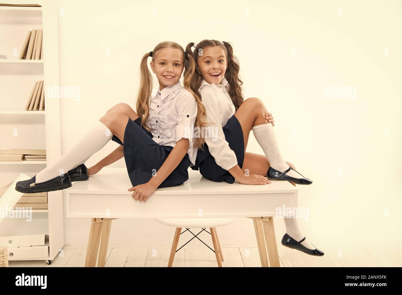 Rebellious spirit. School club. Little schoolgirls classmates friendly ...