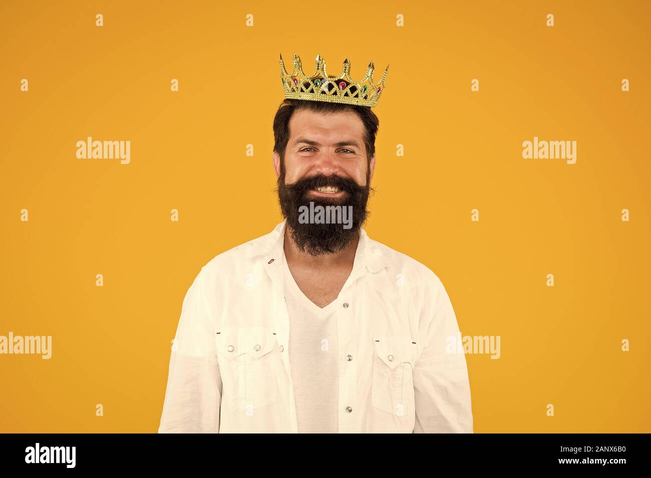 Responsibility being king. Handsome bearded guy king on yellow ...