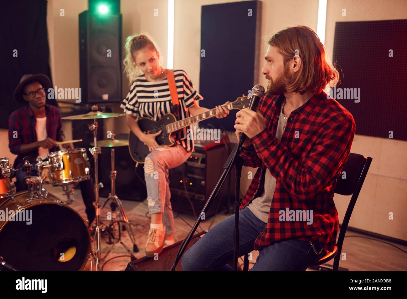 Group people playing musical instrument hi-res stock photography and ...