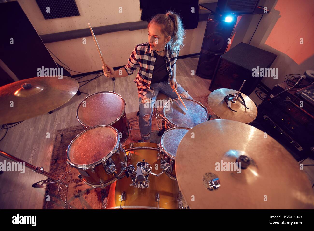 Woman playing the drums hi-res stock photography and images - Alamy