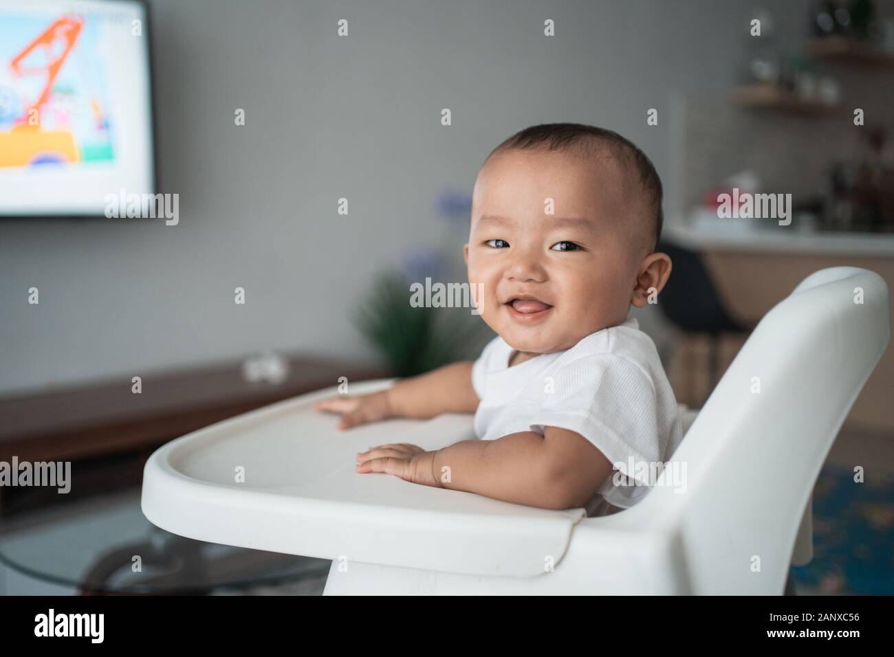 Infant toddler high chair fruit hi-res stock photography and images - Alamy
