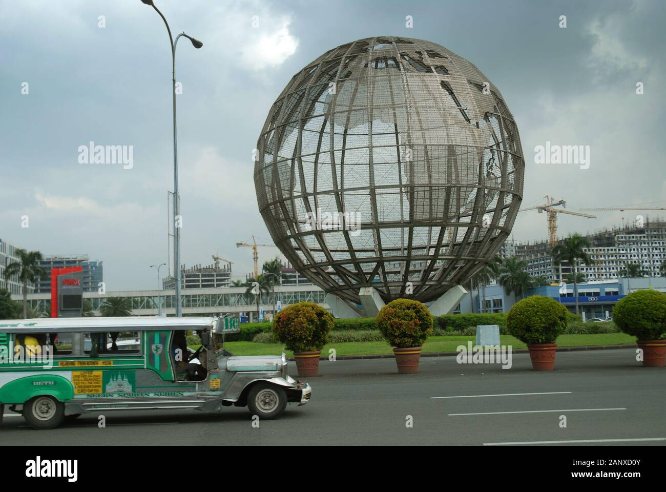 Giant globe at a roundabout outside the Mall of Asia shopping centre ...
