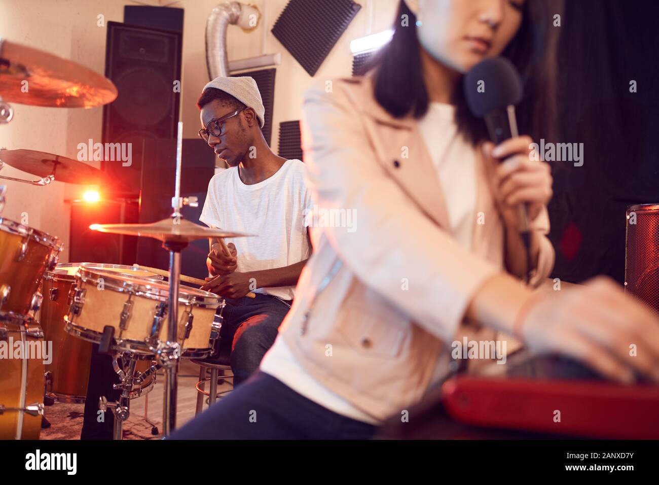 Female musician recording song hi-res stock photography and images - Alamy