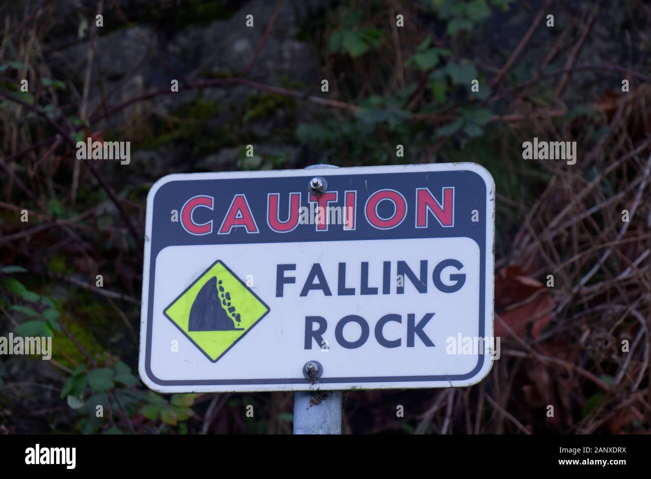 Caution falling stone warning sign hi-res stock photography and images ...
