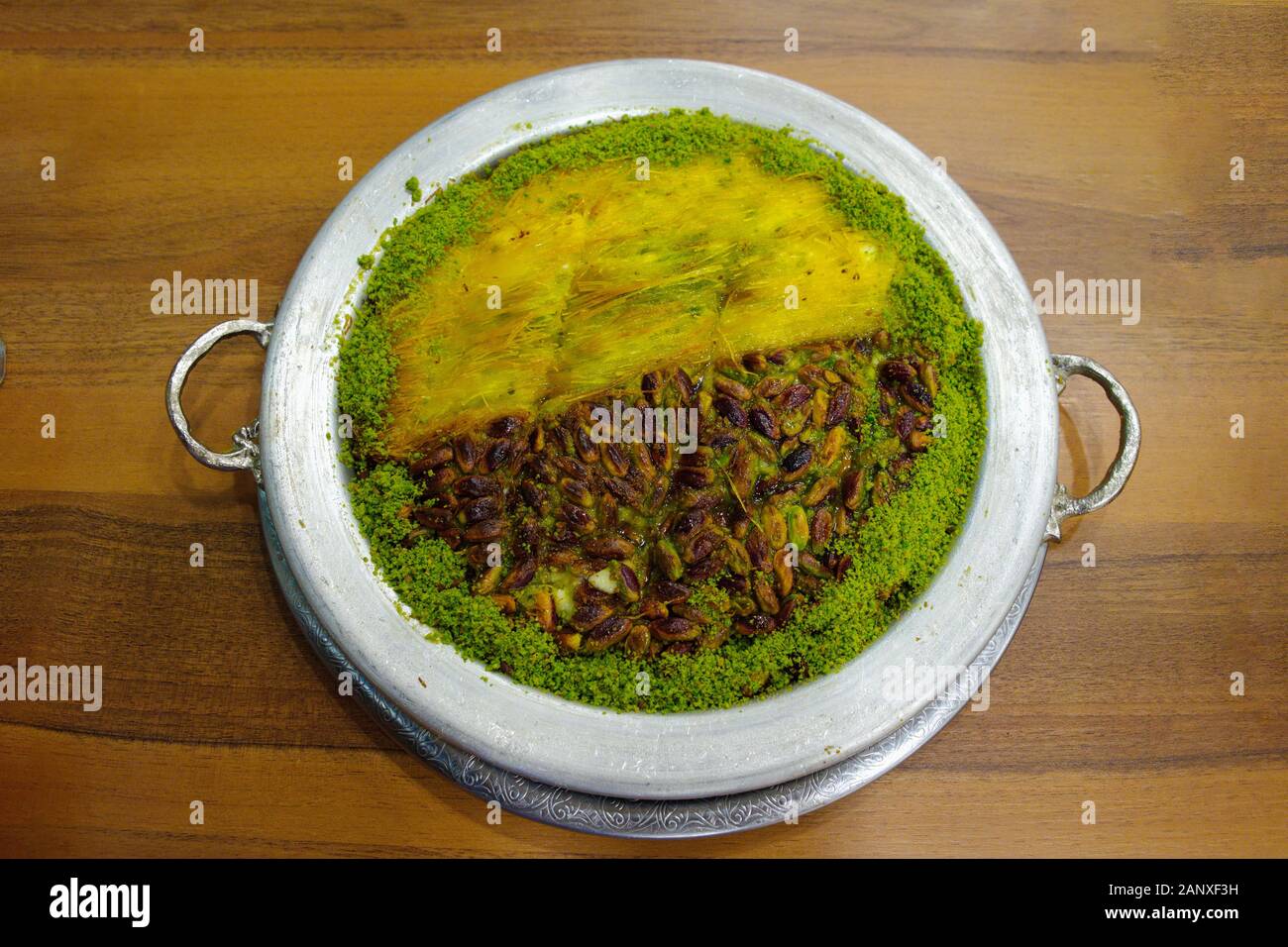 Traditional turkish dessert kunefe, kunafa, kadayif with pistachio ...