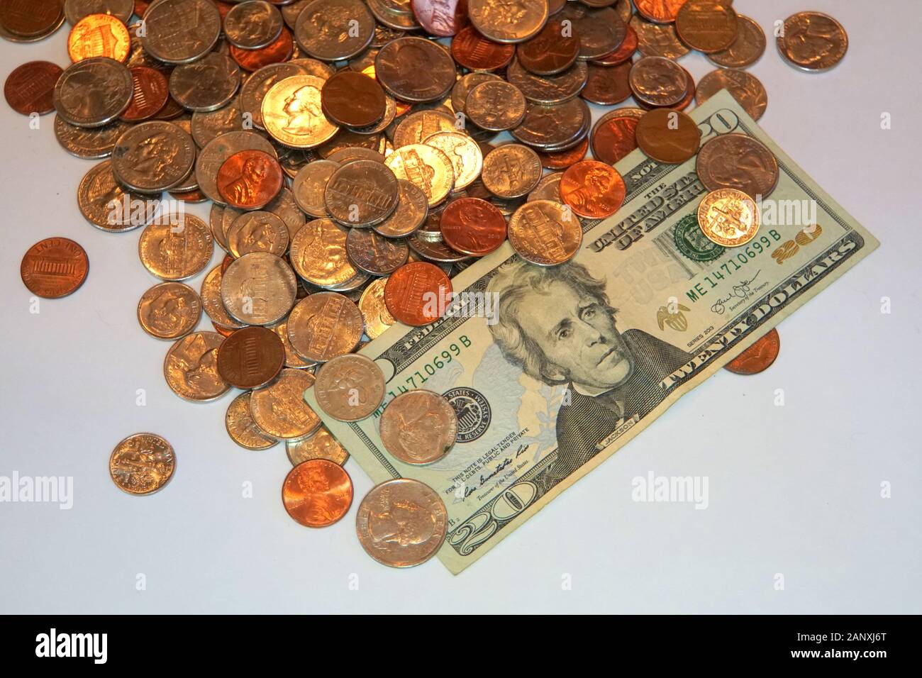 American coins and dollar bills on a white isolated background Stock ...