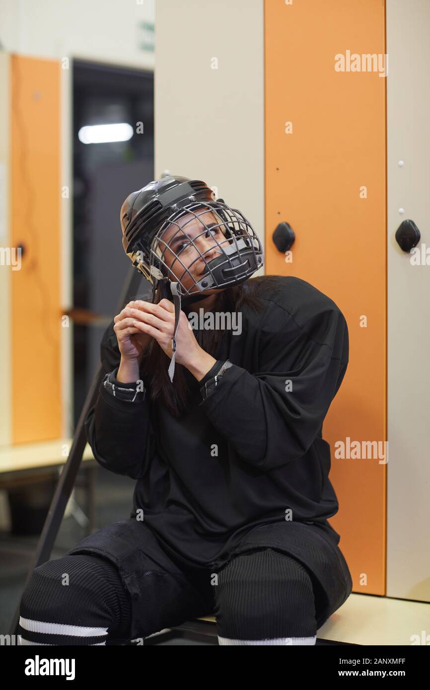 Putting on helmet hi-res stock photography and images - Alamy