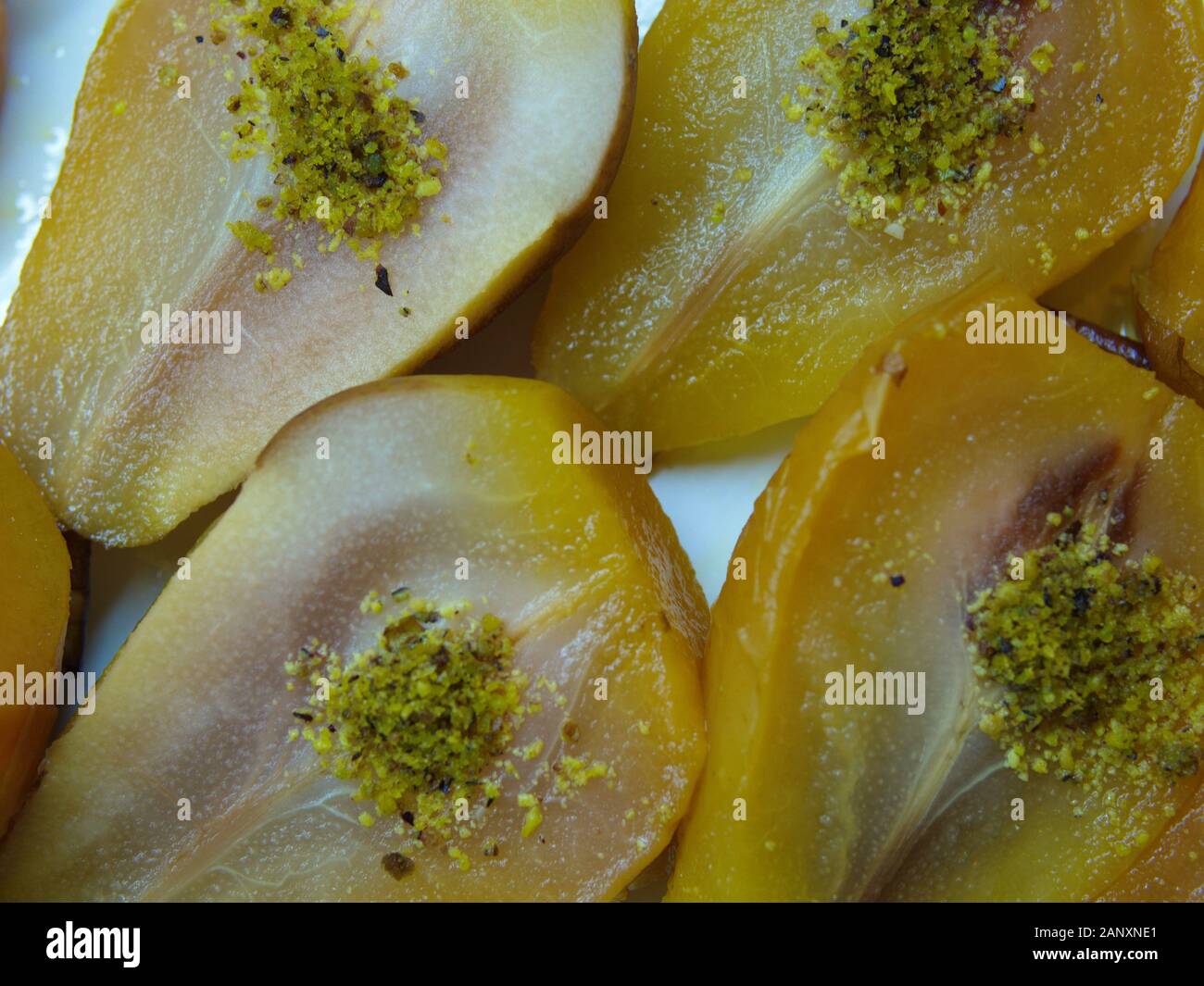 pear dessert. caramelized fruit dessert. served with pistachios Stock ...