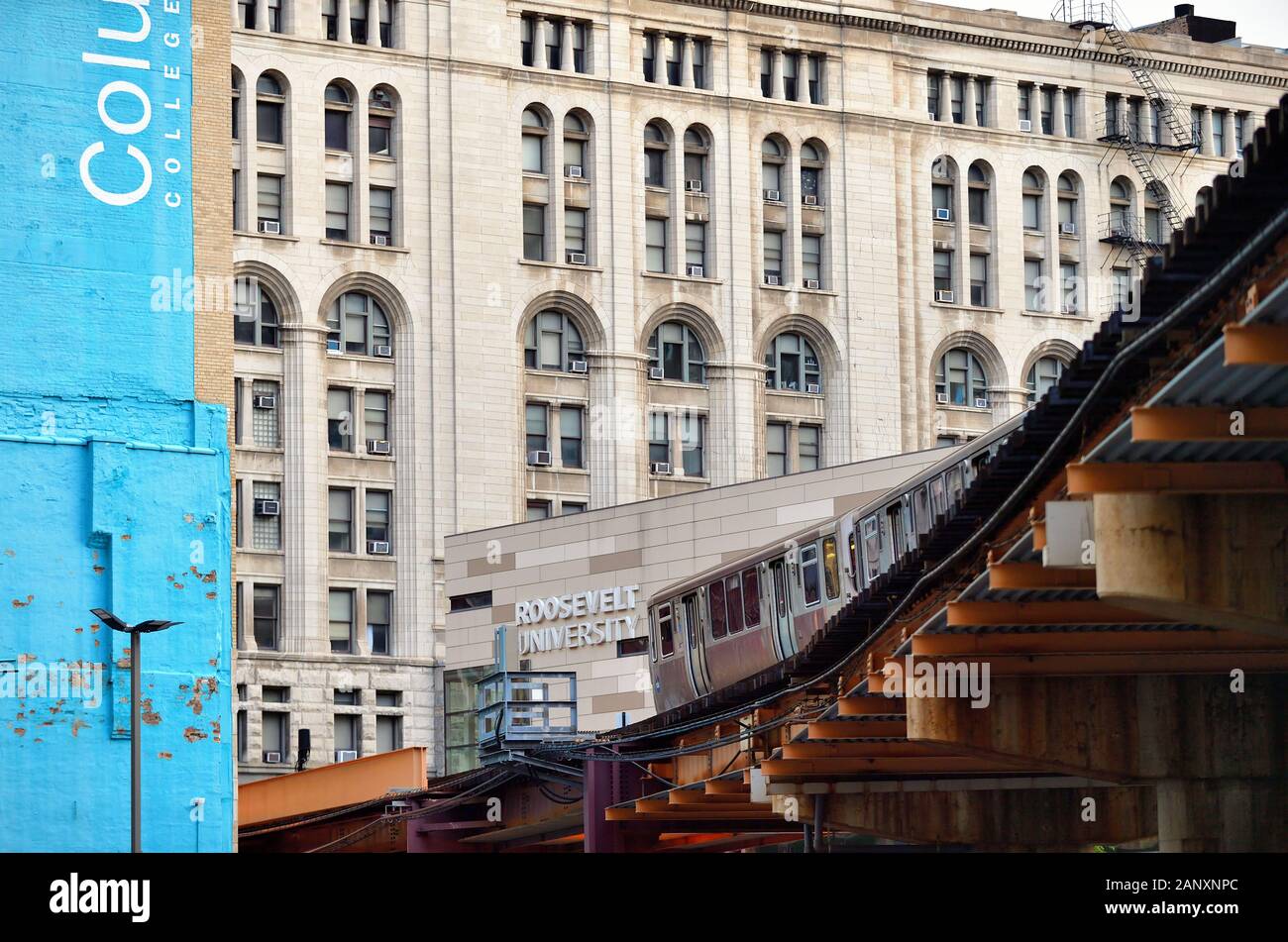 Chicago, Illinois, USA. A CTA Orange Line L train entering the Wabash ...