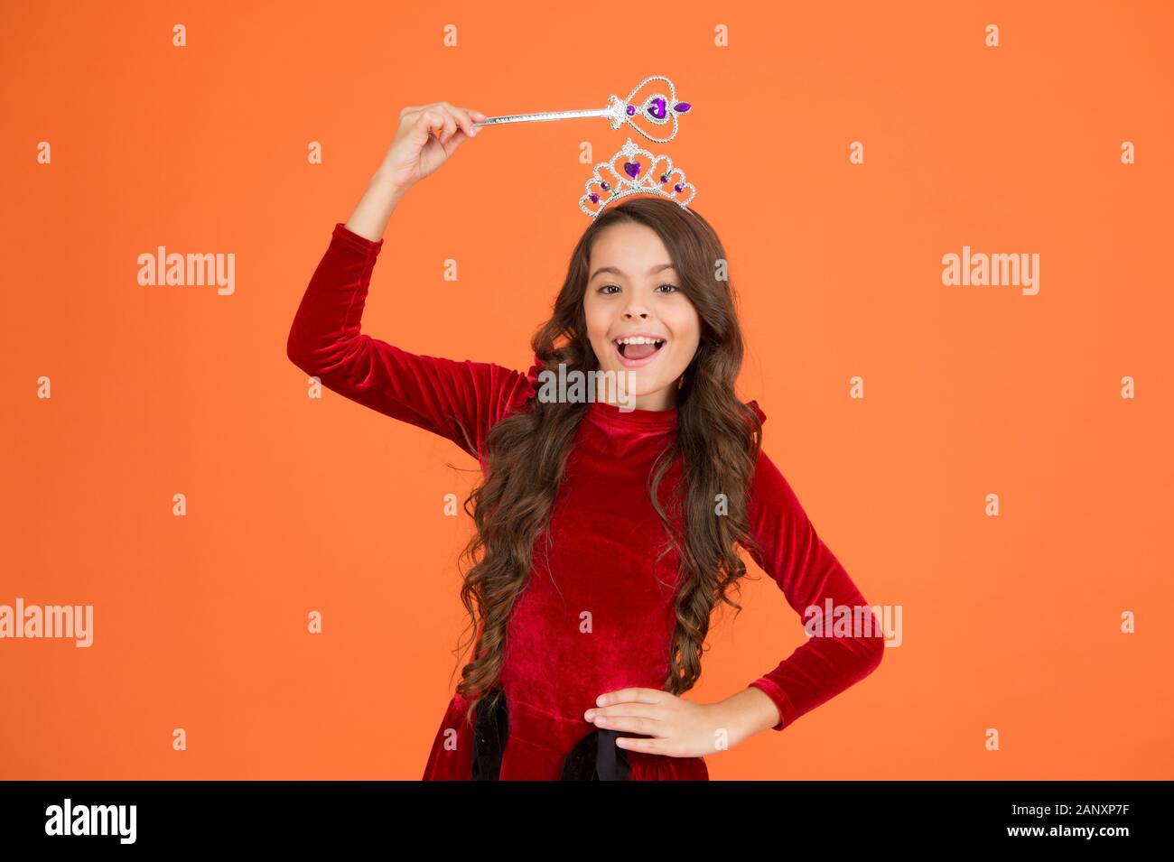 Cute kid doing magic. Amazing miracles. Little child long hair ...