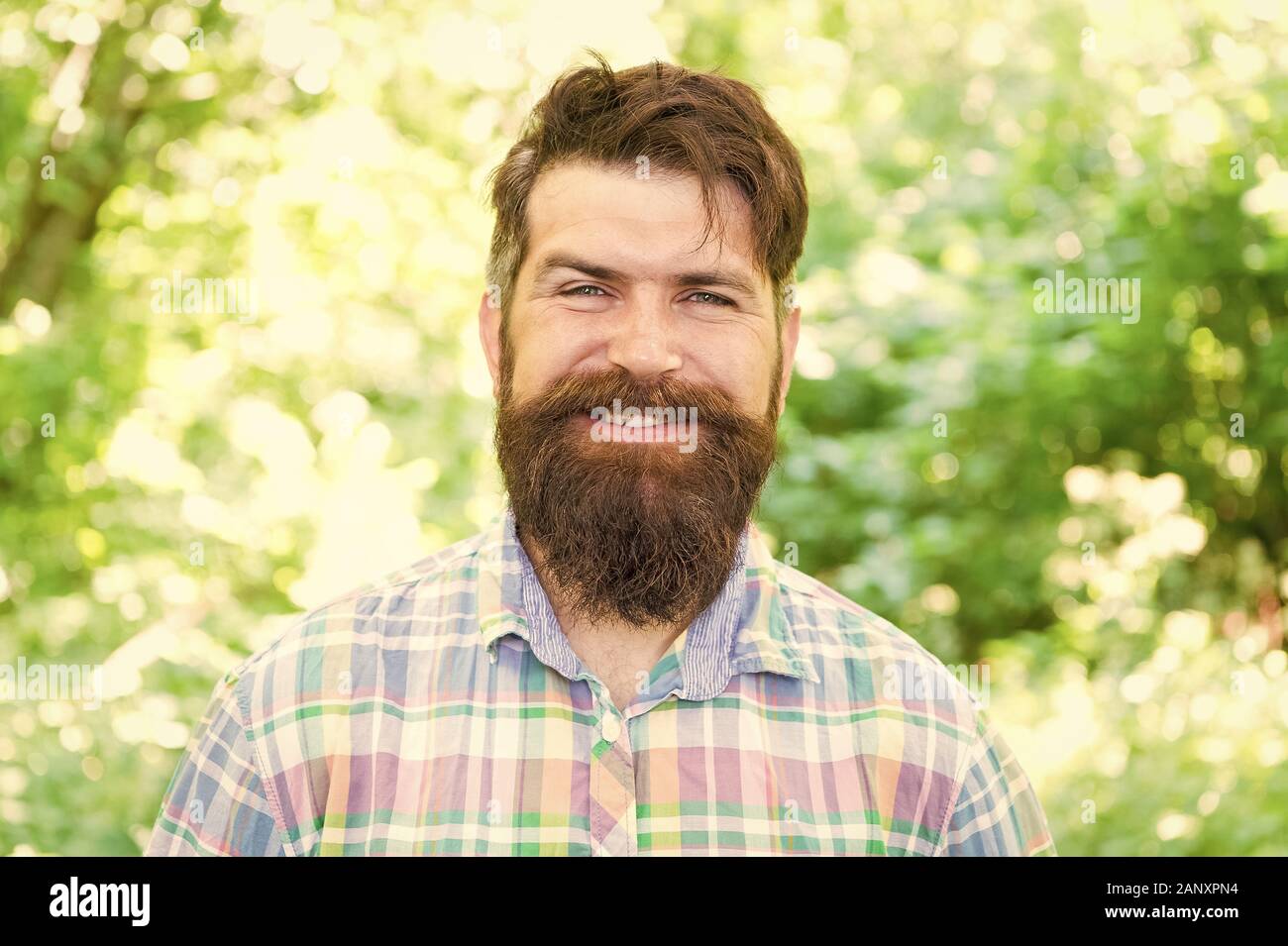 Smiling increases happiness. Bearded man with cheerful smiling face on ...