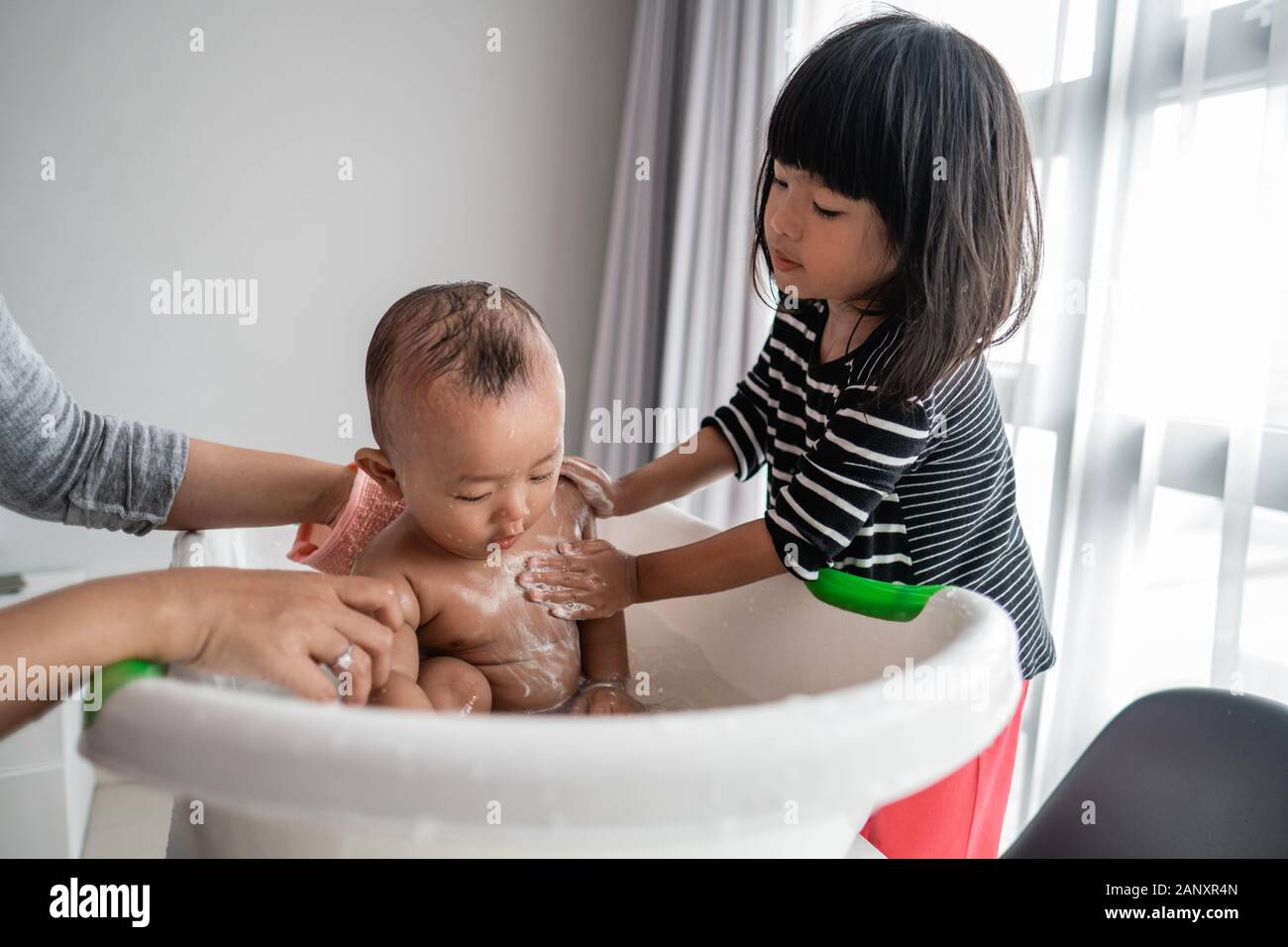 Sister Bathing Baby Hi res Stock Photography And Images Alamy Sister Bathing Baby Hi res Stock Photography And Images Alamy