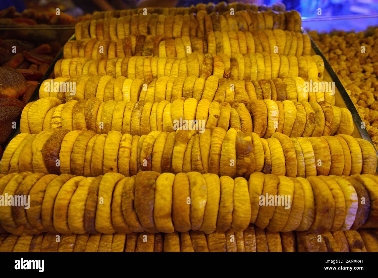 dried figs. background flavor stack. dried fruits sold at the counter ...