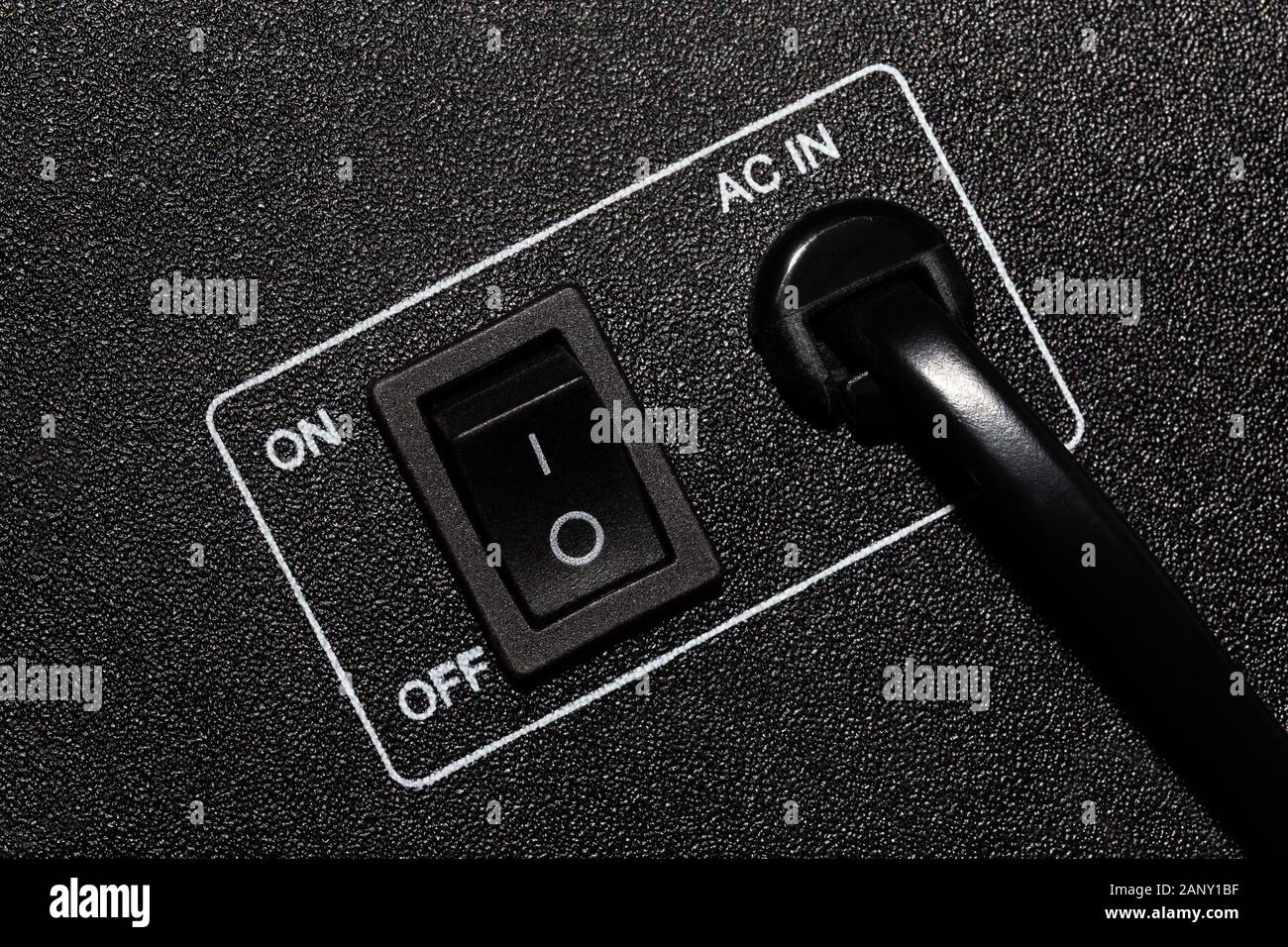 The panel of the household appliance with the power cord and switch ...