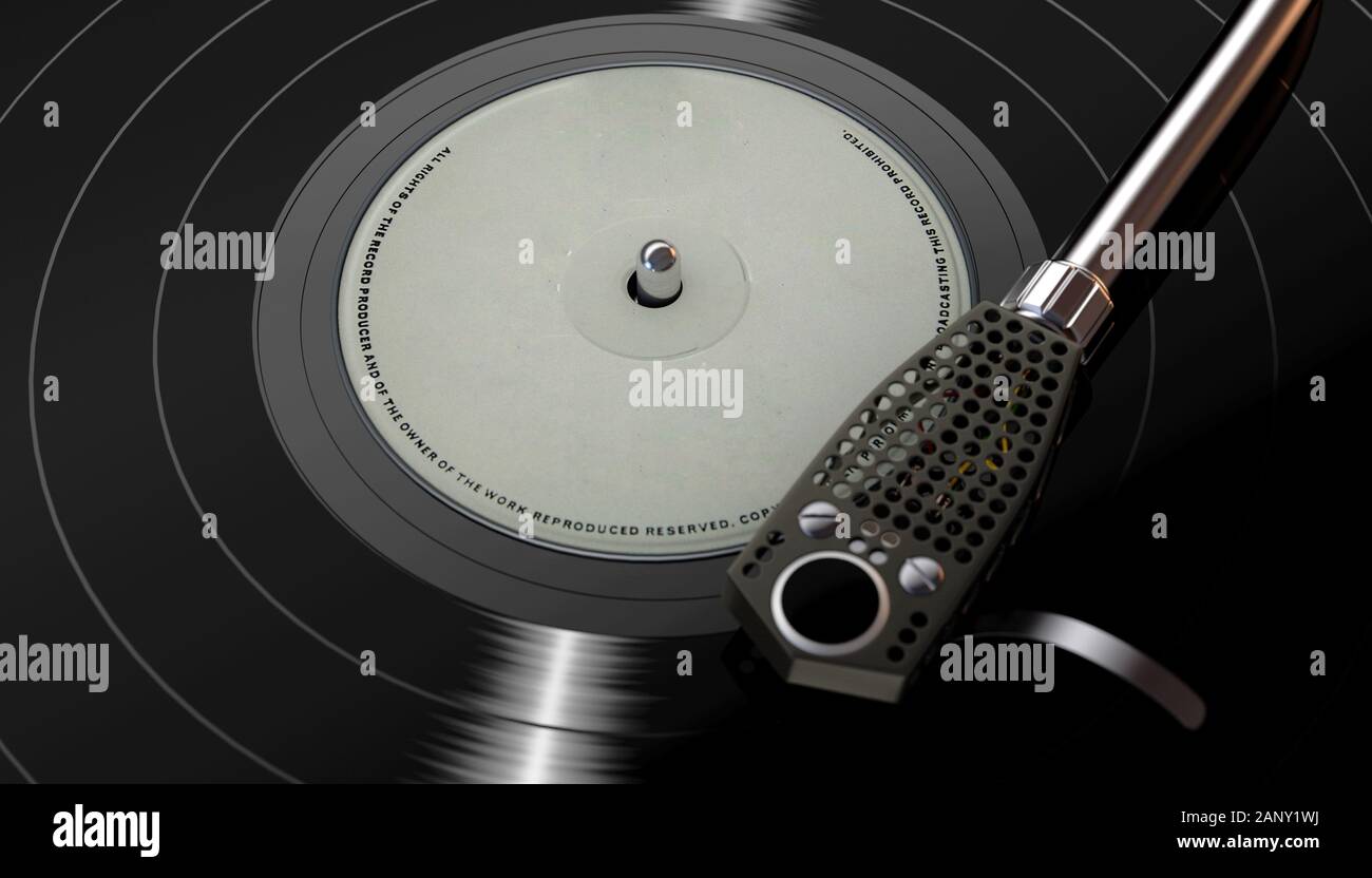 A vintage unbranded turntable playing a generic vinyl record on a moody ...