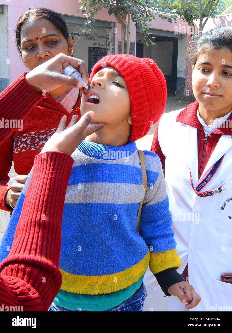 India. 19th Jan, 2020. A child being administered pulse polio vaccine ...