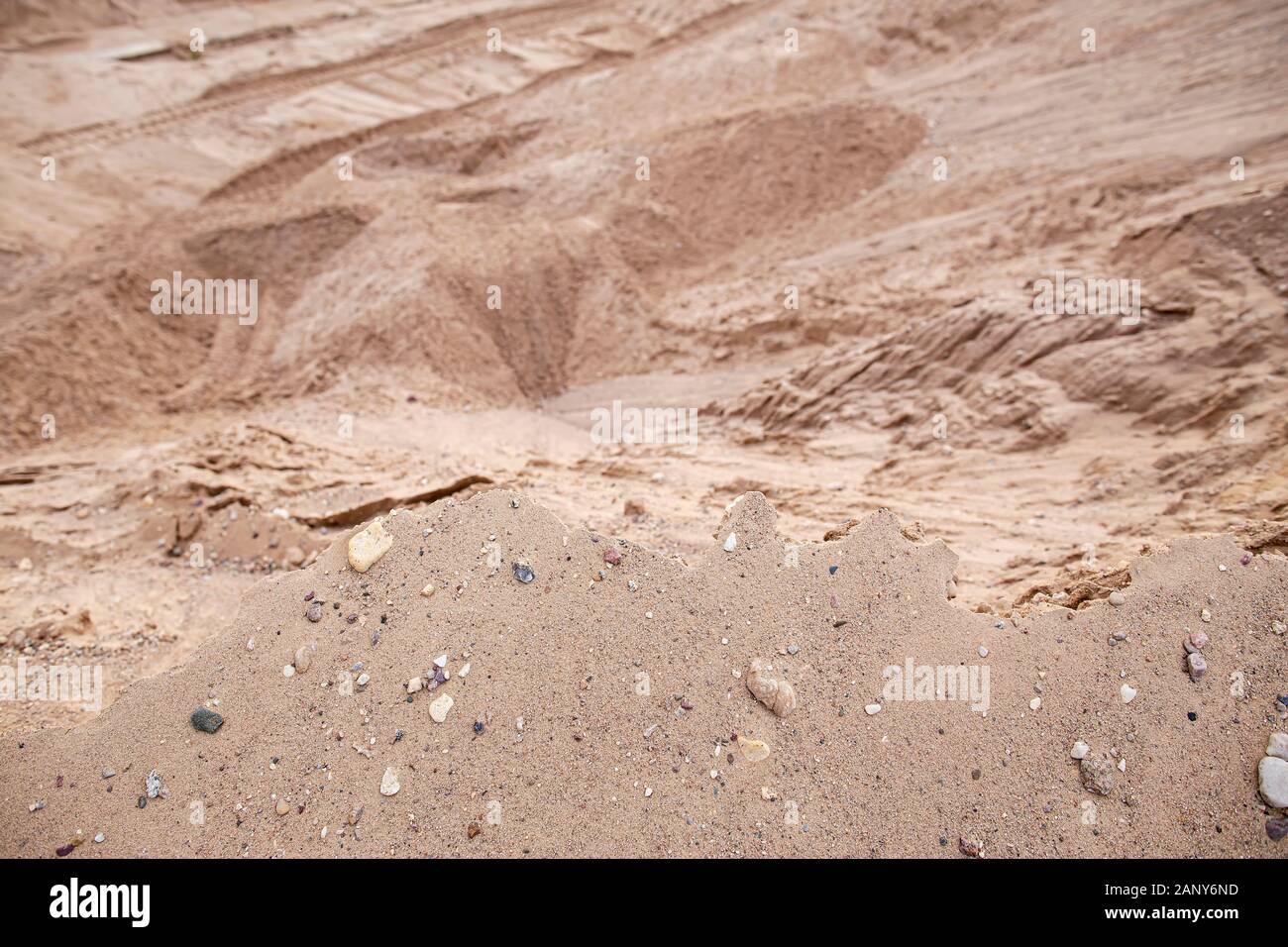 Dangerous edge of the sand quarry and steep cliff down. Quarrying and ...