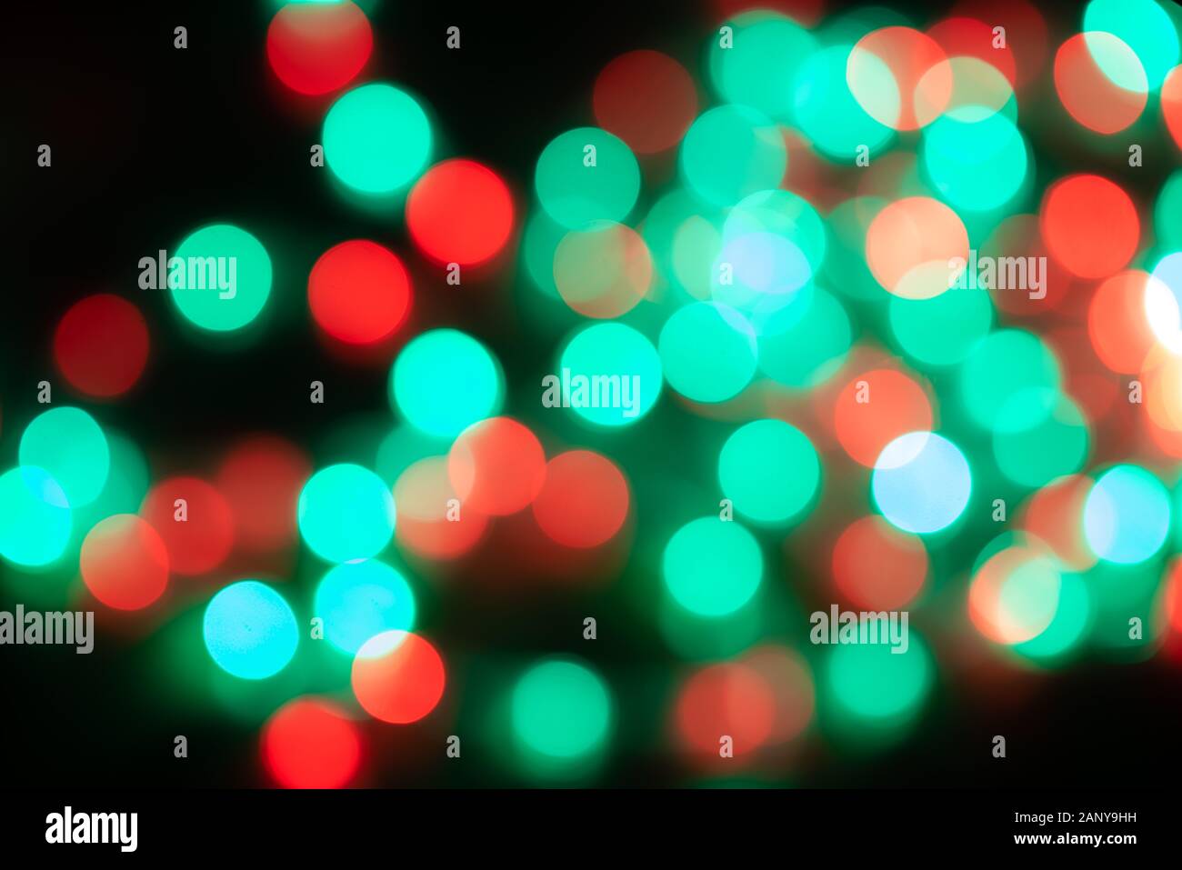 Colorful defocused lights forming a pattern in the dark Stock Photo - Alamy