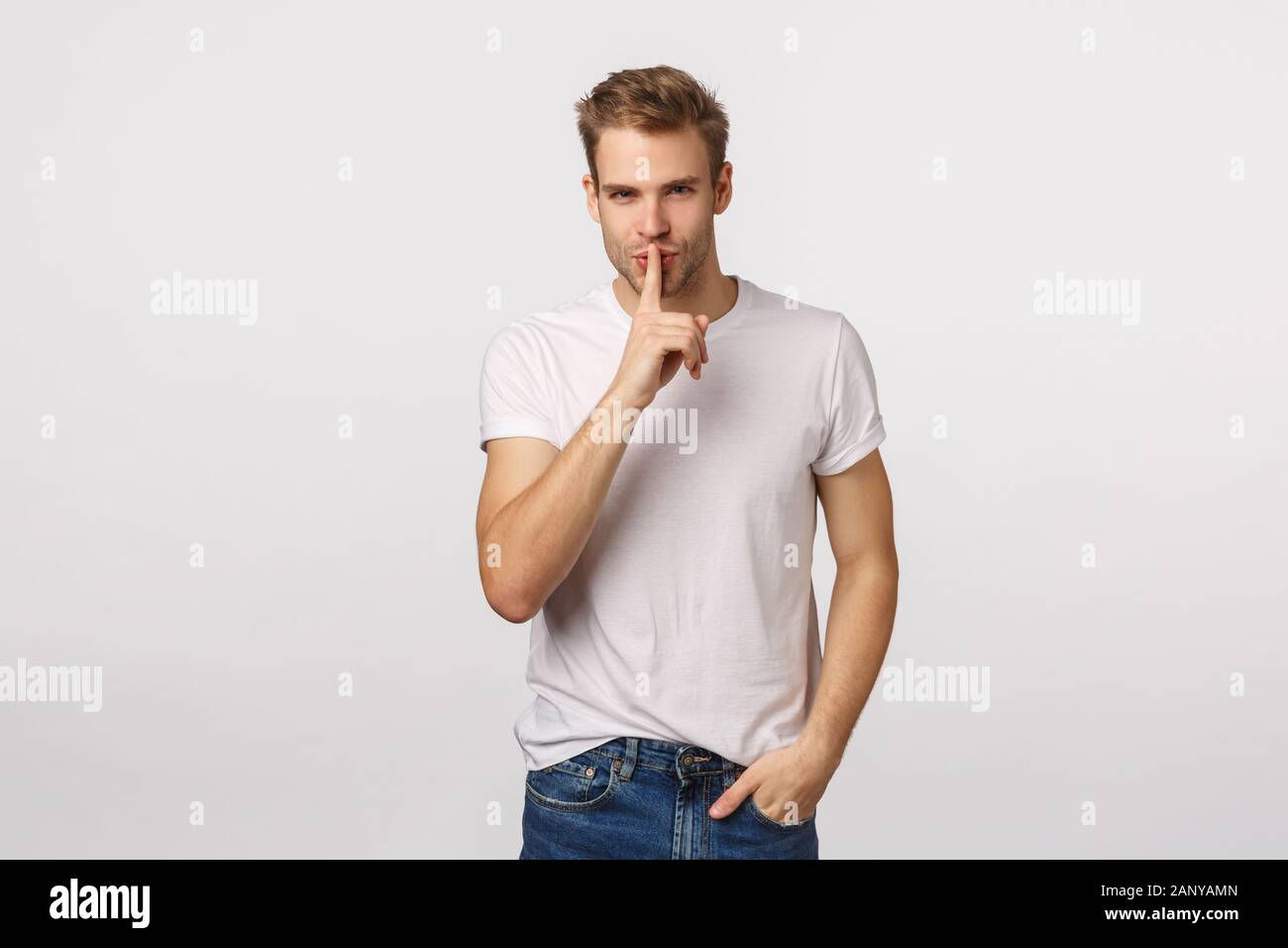 Sensual and creative, charming mysterious handsome blond man prepare ...