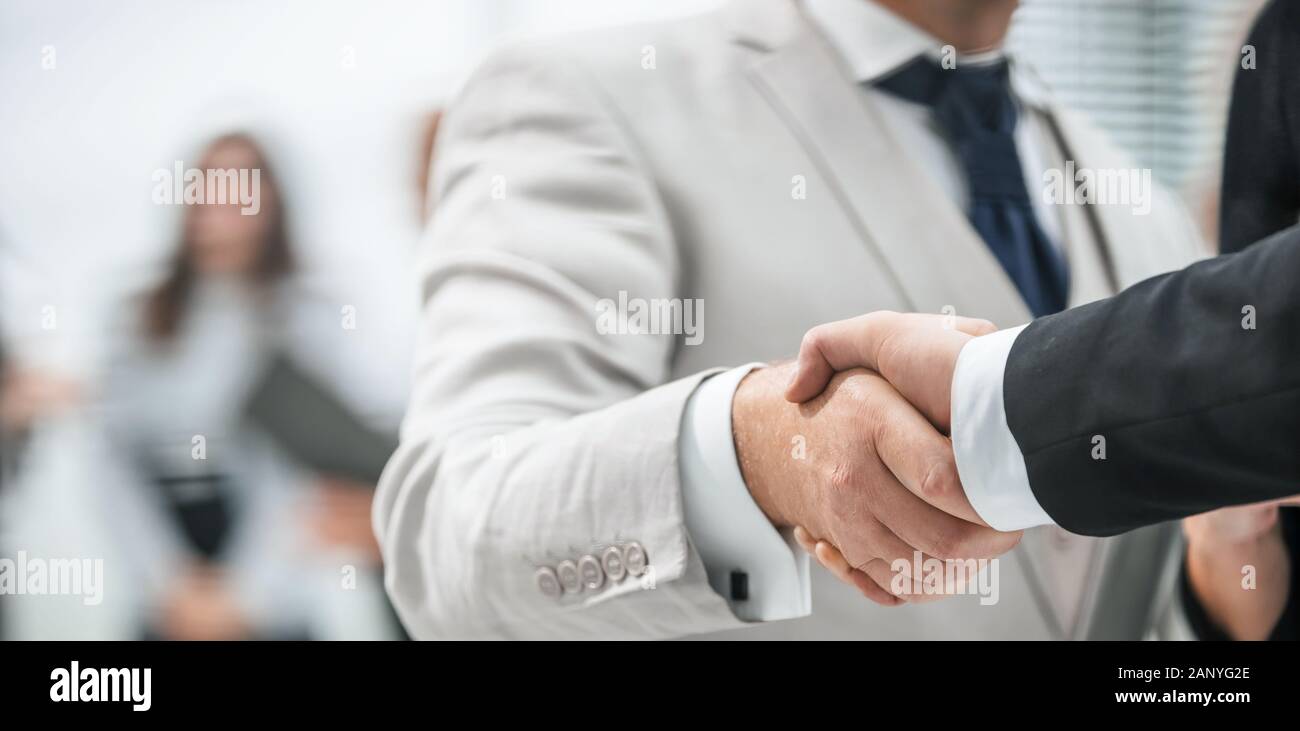 close up. business handshake on office background Stock Photo - Alamy
