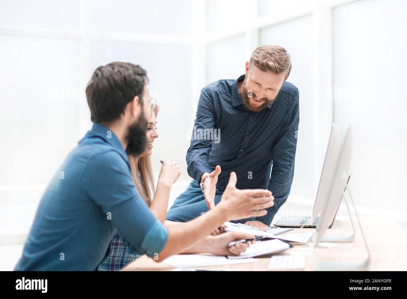 project Manager explaining to the staff the current task Stock Photo ...