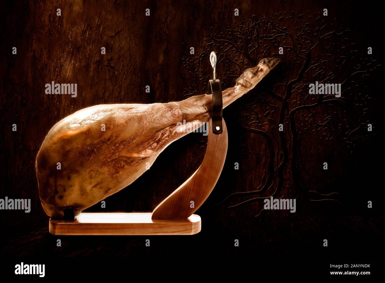 Whole Spanish Iberian ham leg extra quality on wooden background with ...