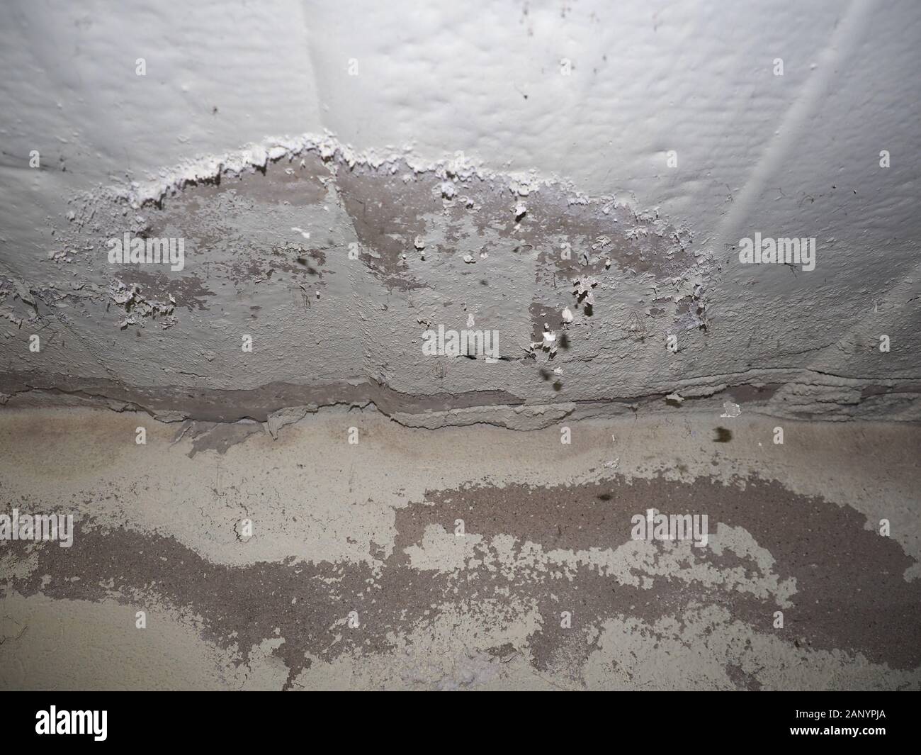 damage caused by dampness and moisture on a wall and ceiling Stock ...