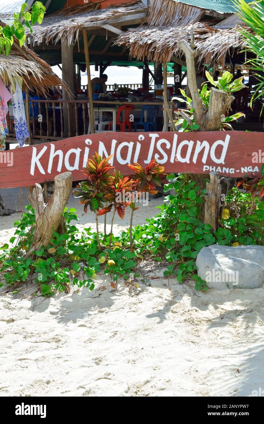 Wooden sign welcoming tourists on the isolated island Stock Photo - Alamy
